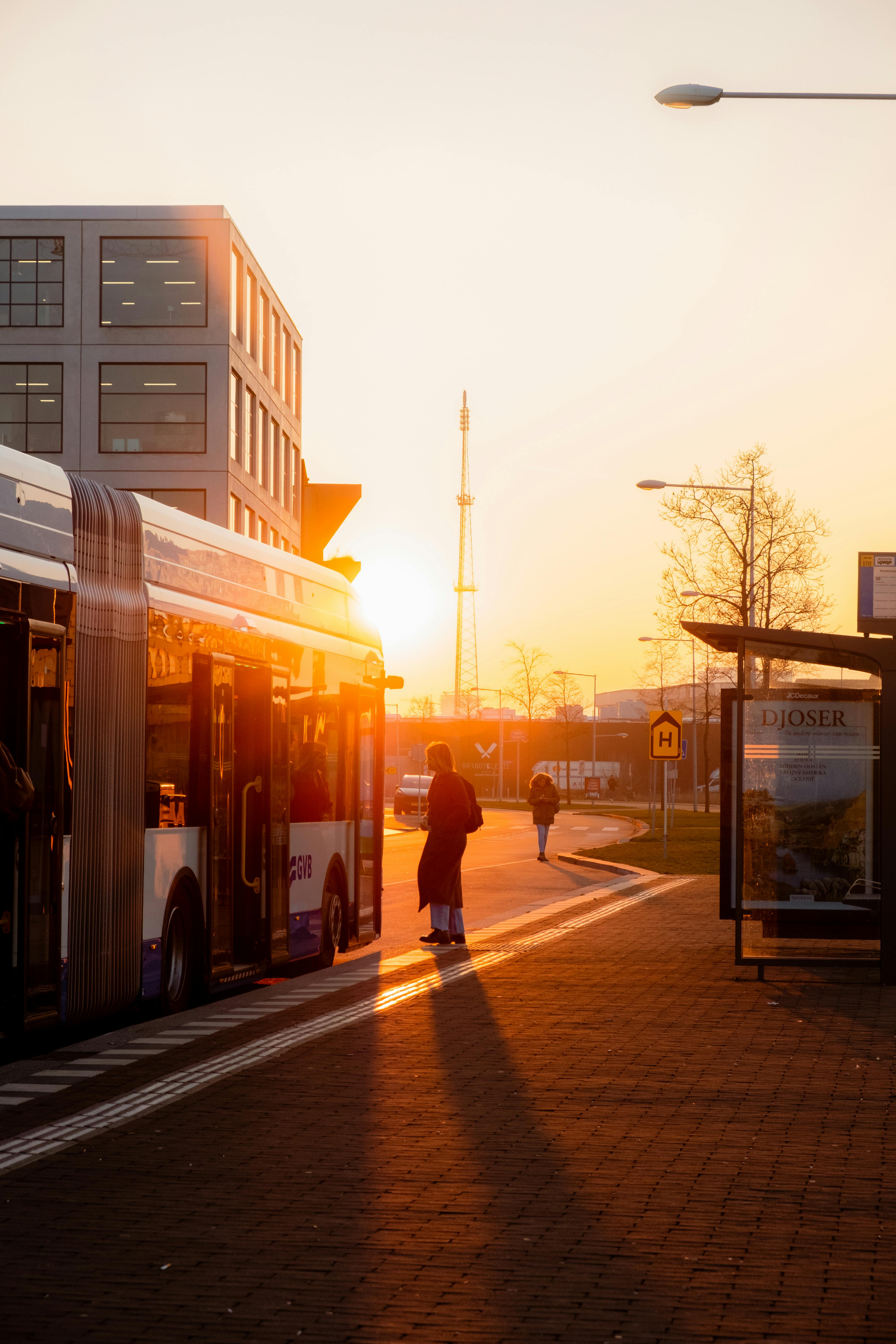 Sunlight over Bus Stop at Sunset · Free Stock Photo