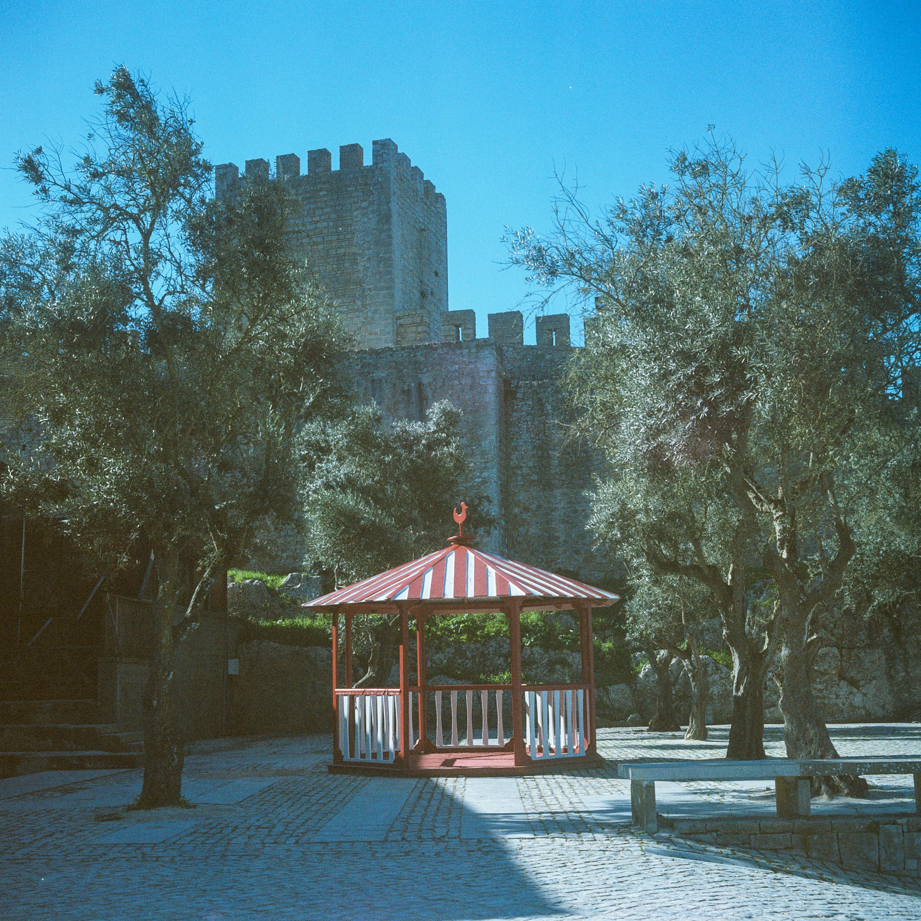 Red Building on a Square of a Castle · Free Stock Photo