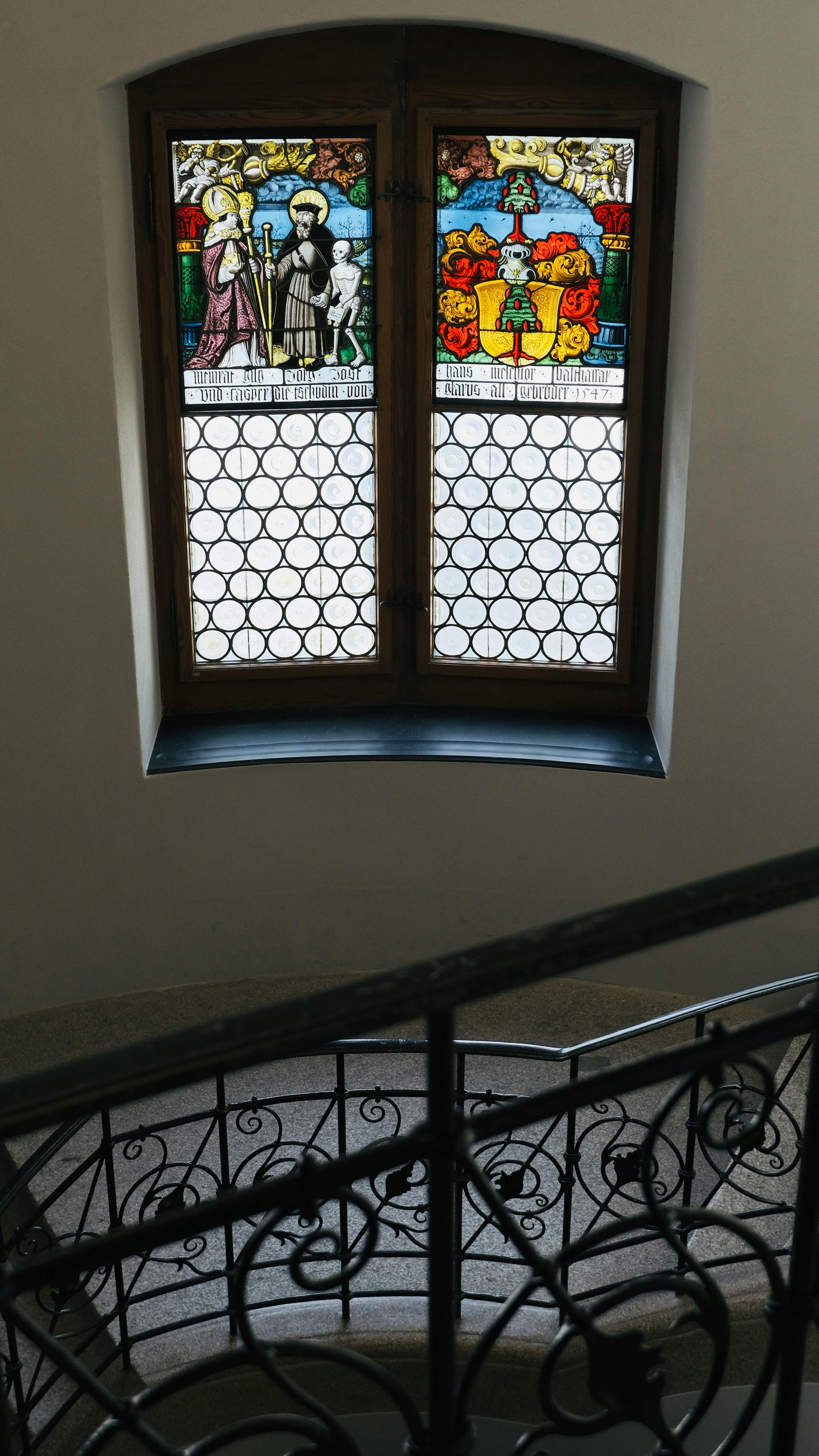 A Stained Glass Window on a Staircase · Free Stock Photo