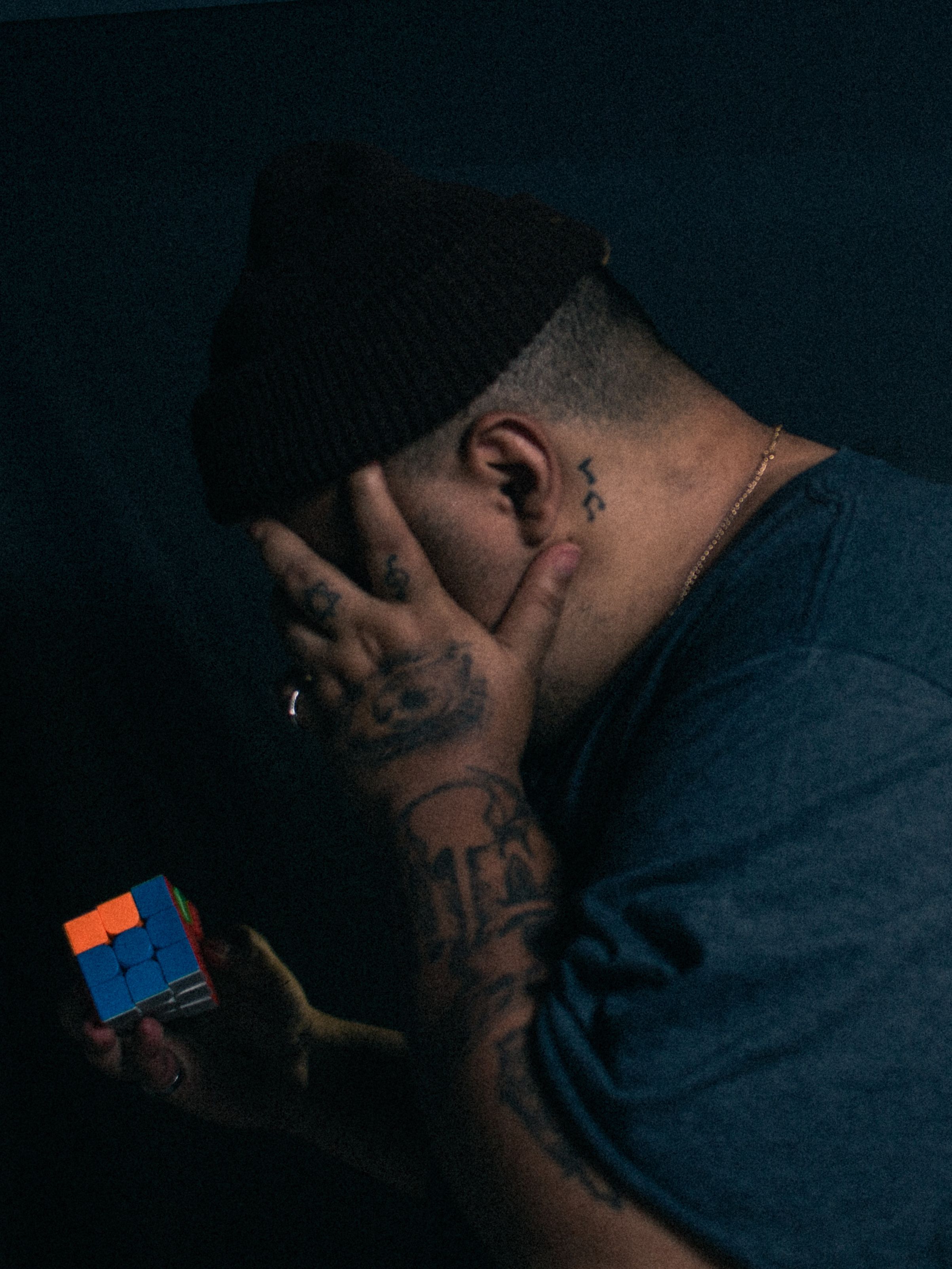 Man Solving the Rubiks Cube · Free Stock Photo