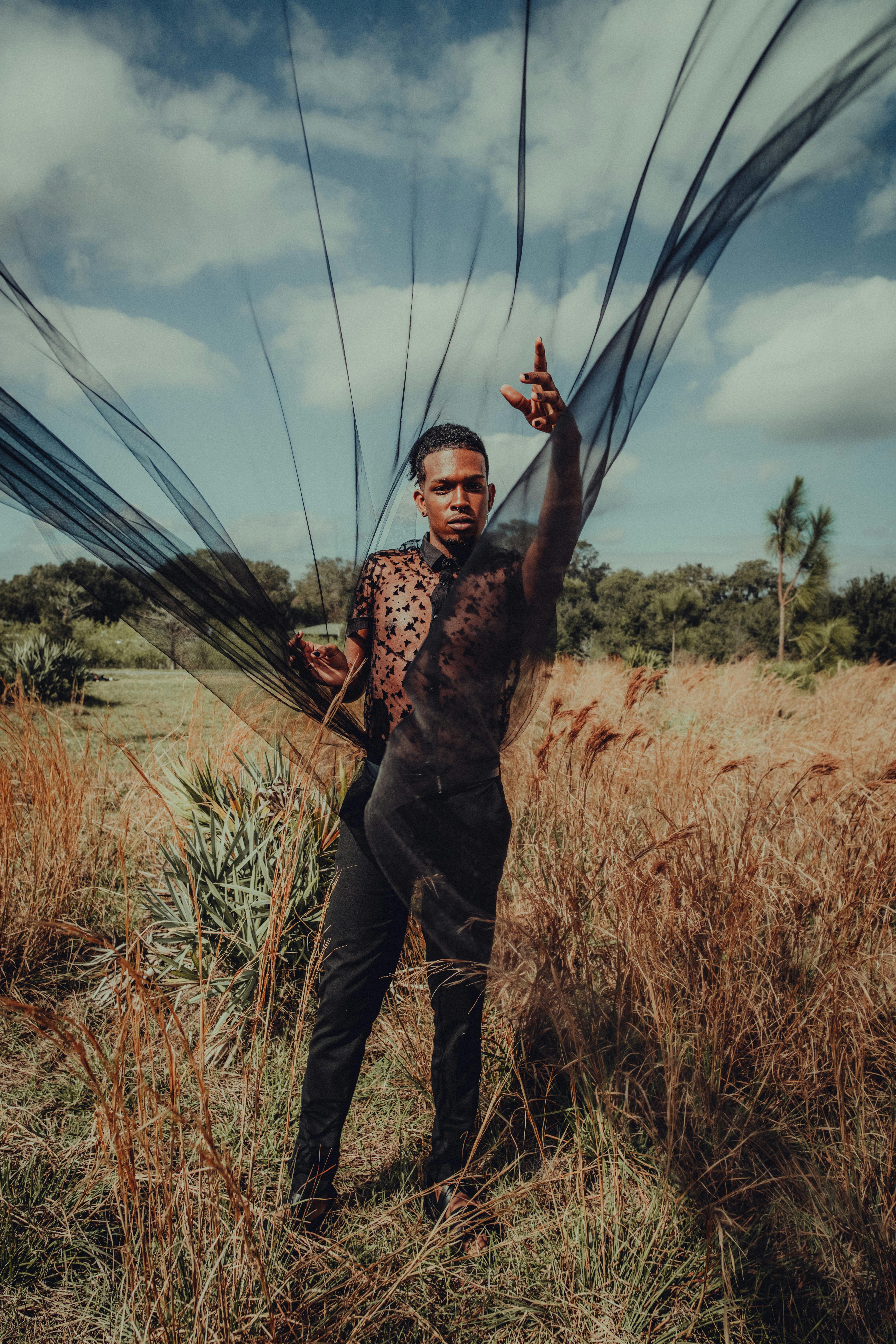 Man in Veil on Field · Free Stock Photo