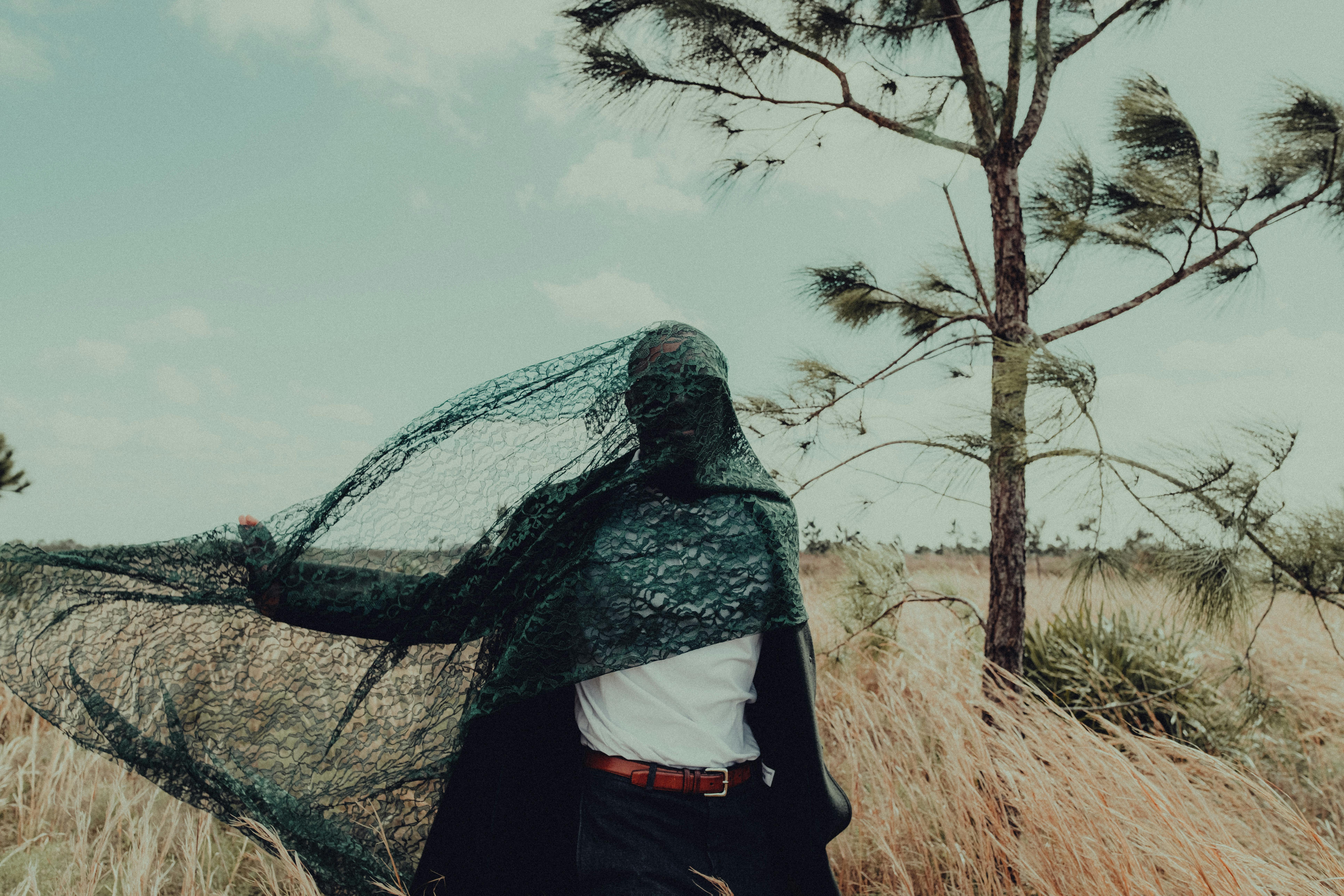 Man in Veil on Field · Free Stock Photo