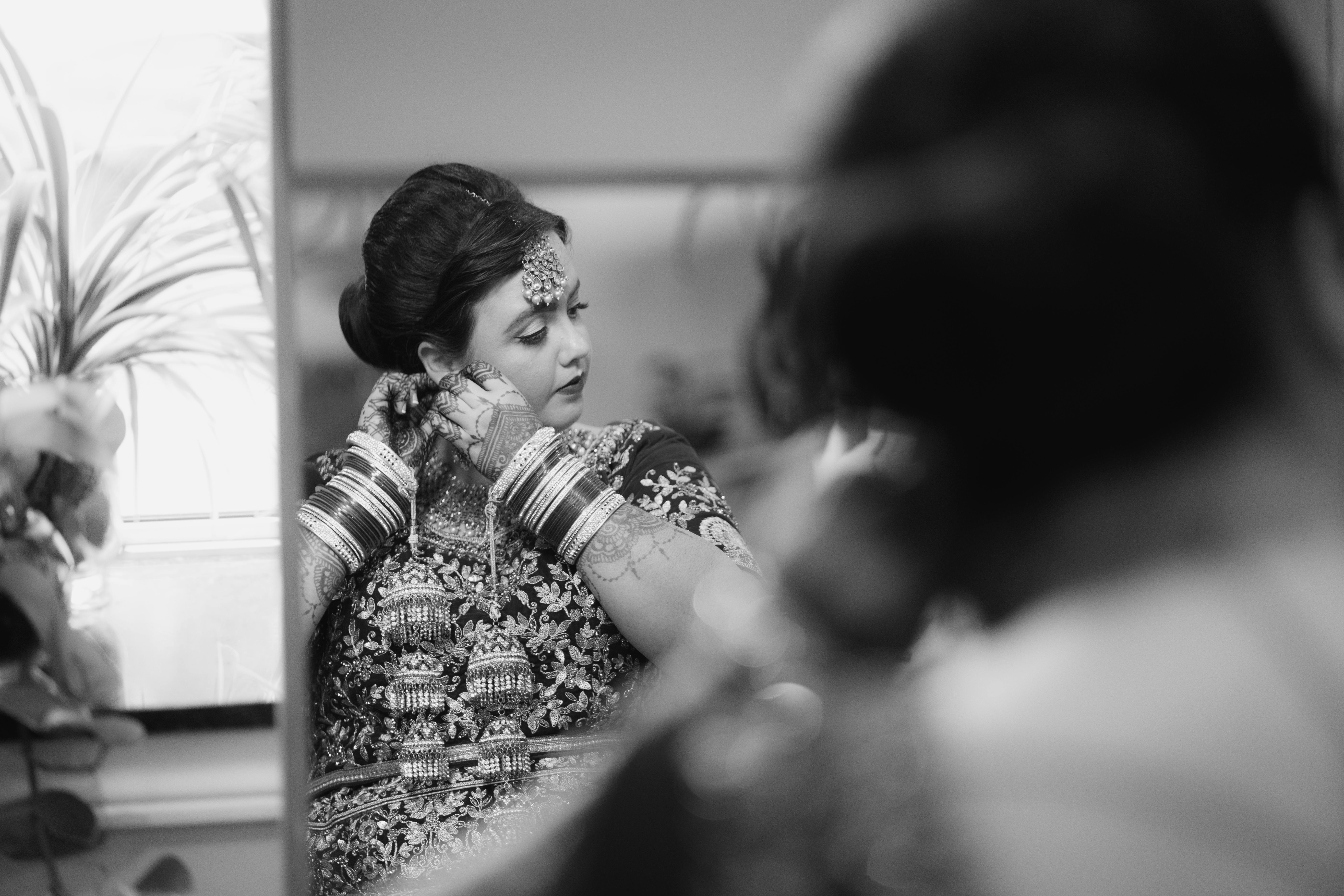 Woman in Traditional Clothing Dressing Up · Free Stock Photo