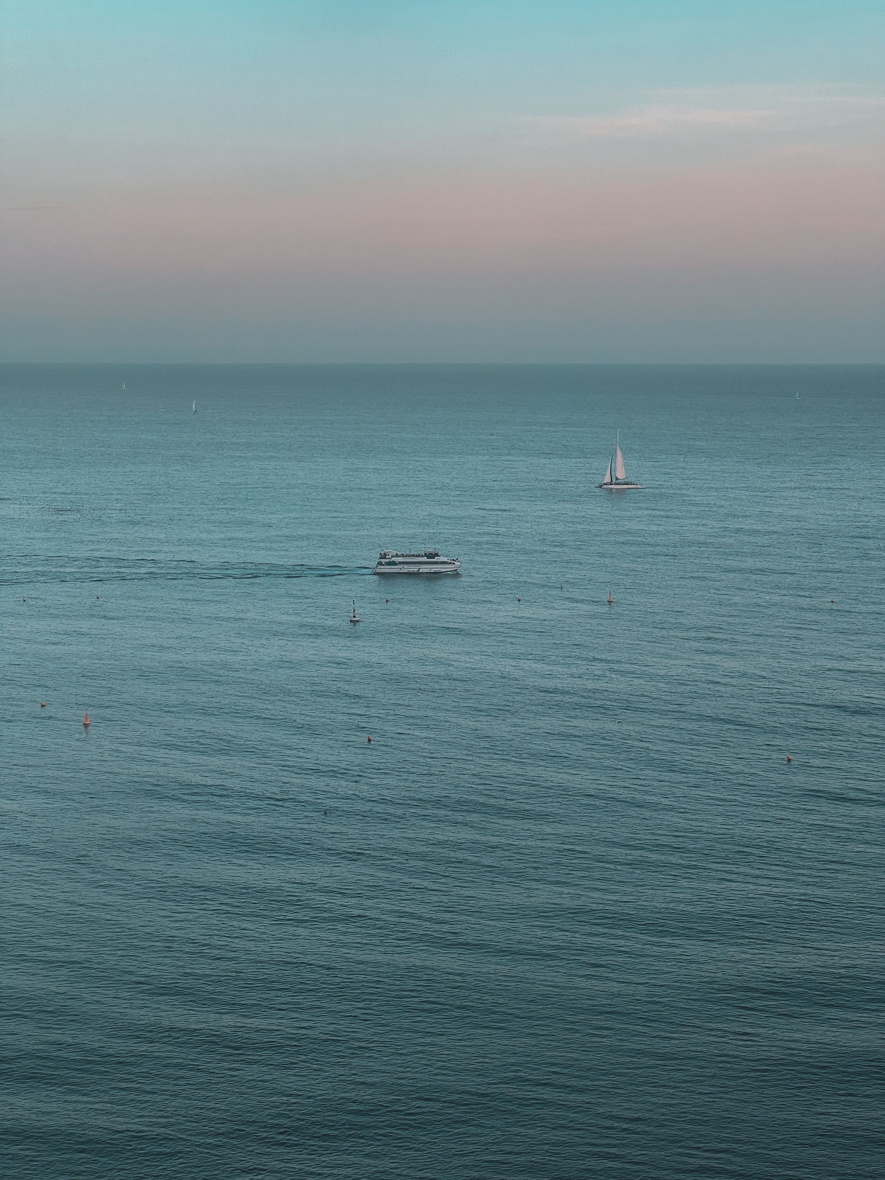 Boats on Calm Ocean · Free Stock Photo