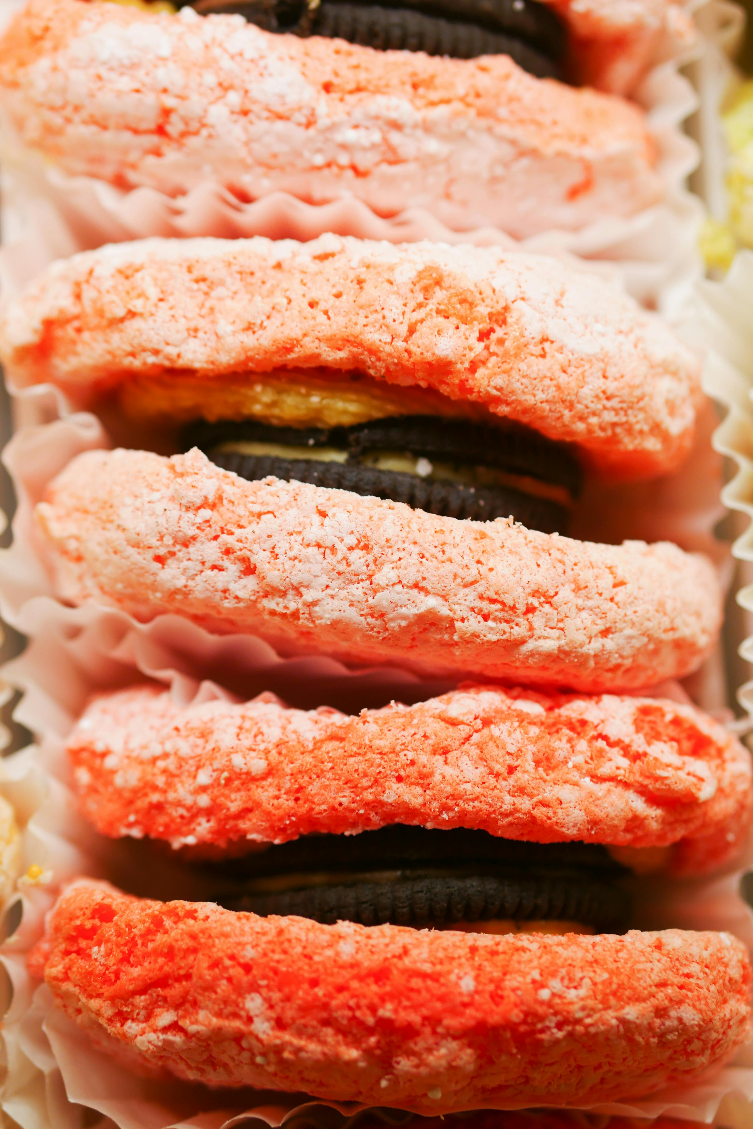 Cookies and Pink Pastry on Stack · Free Stock Photo