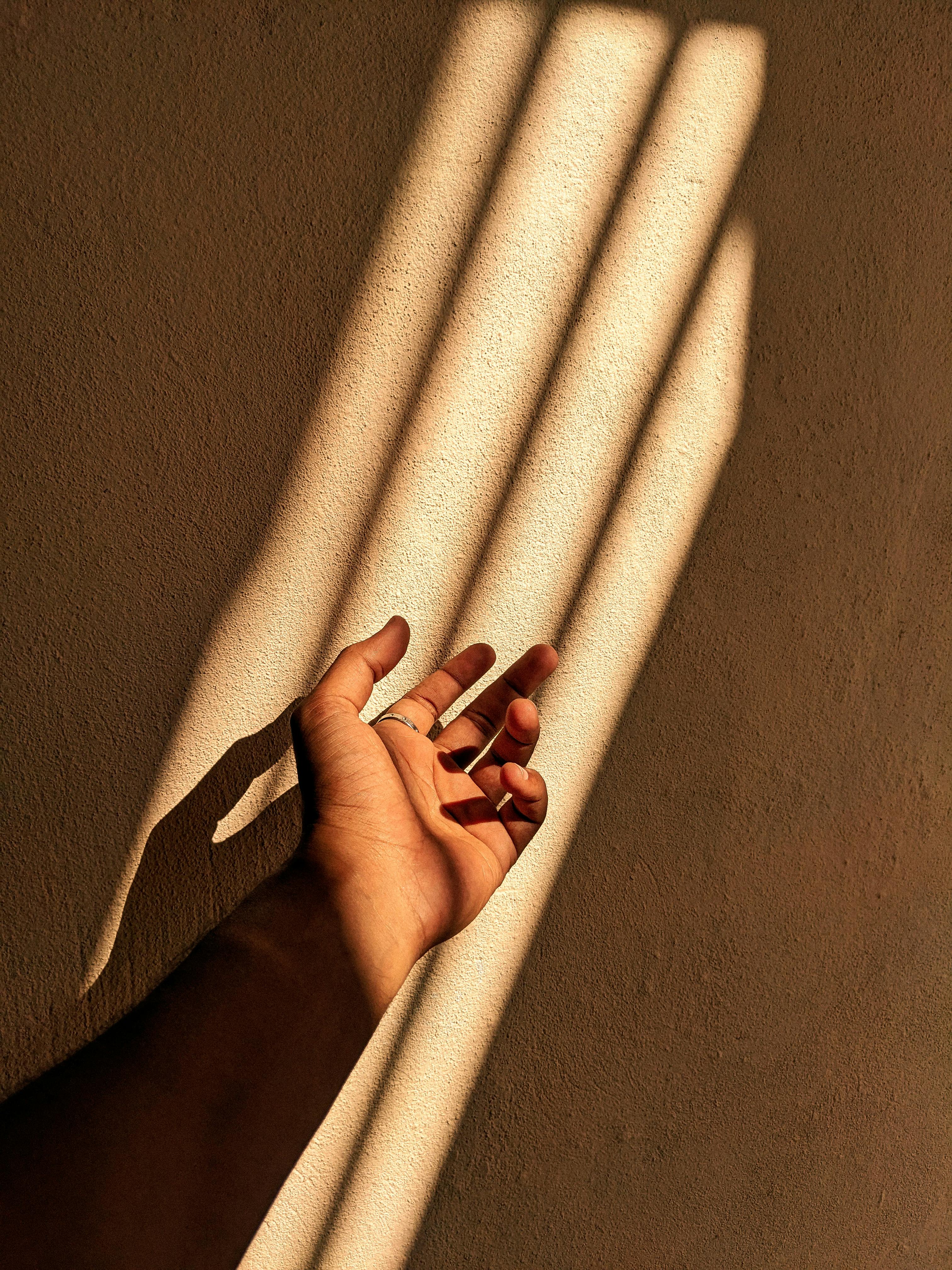 Hand Casting Shadow · Free Stock Photo