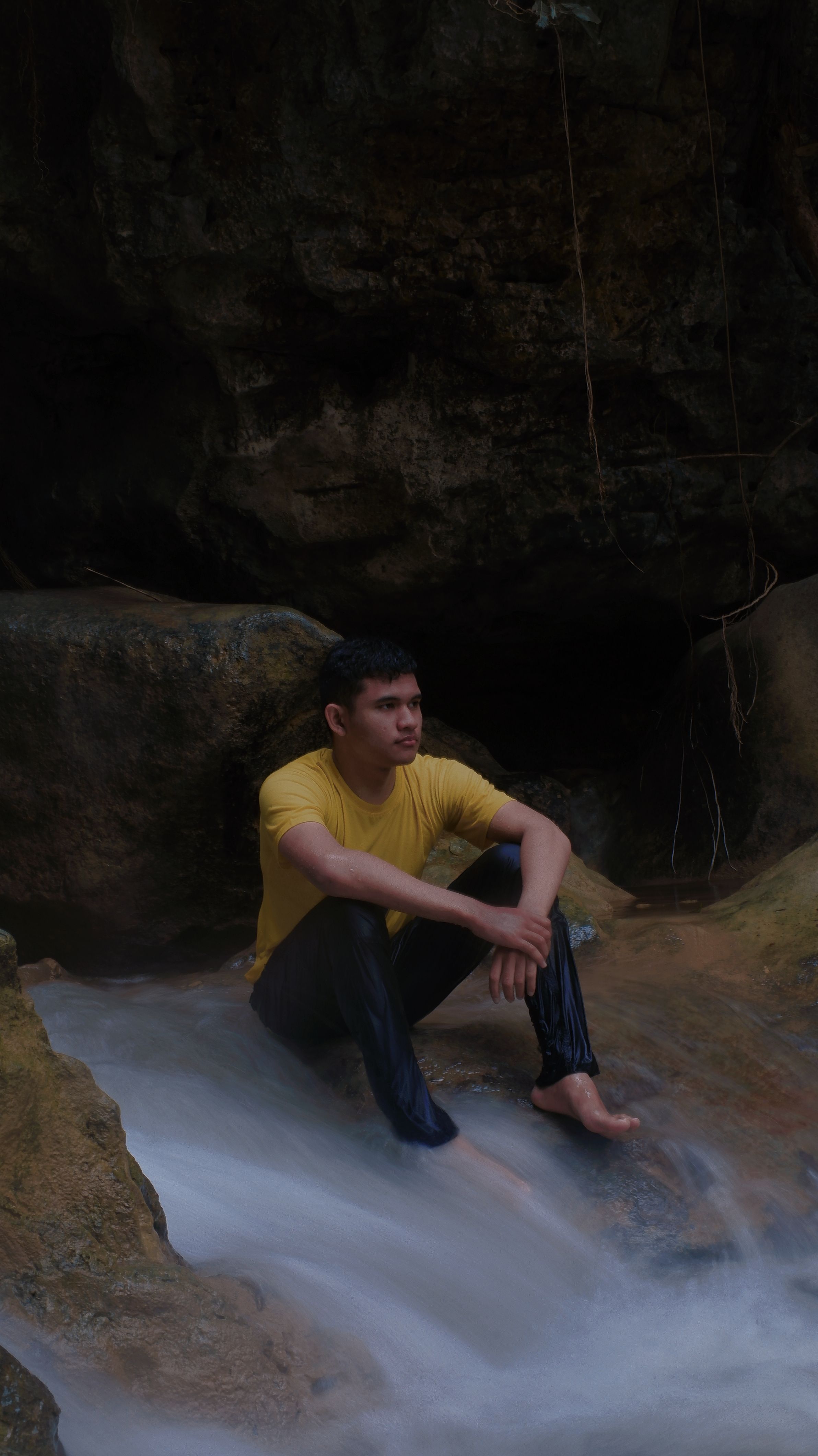 Man Sitting on Stream · Free Stock Photo