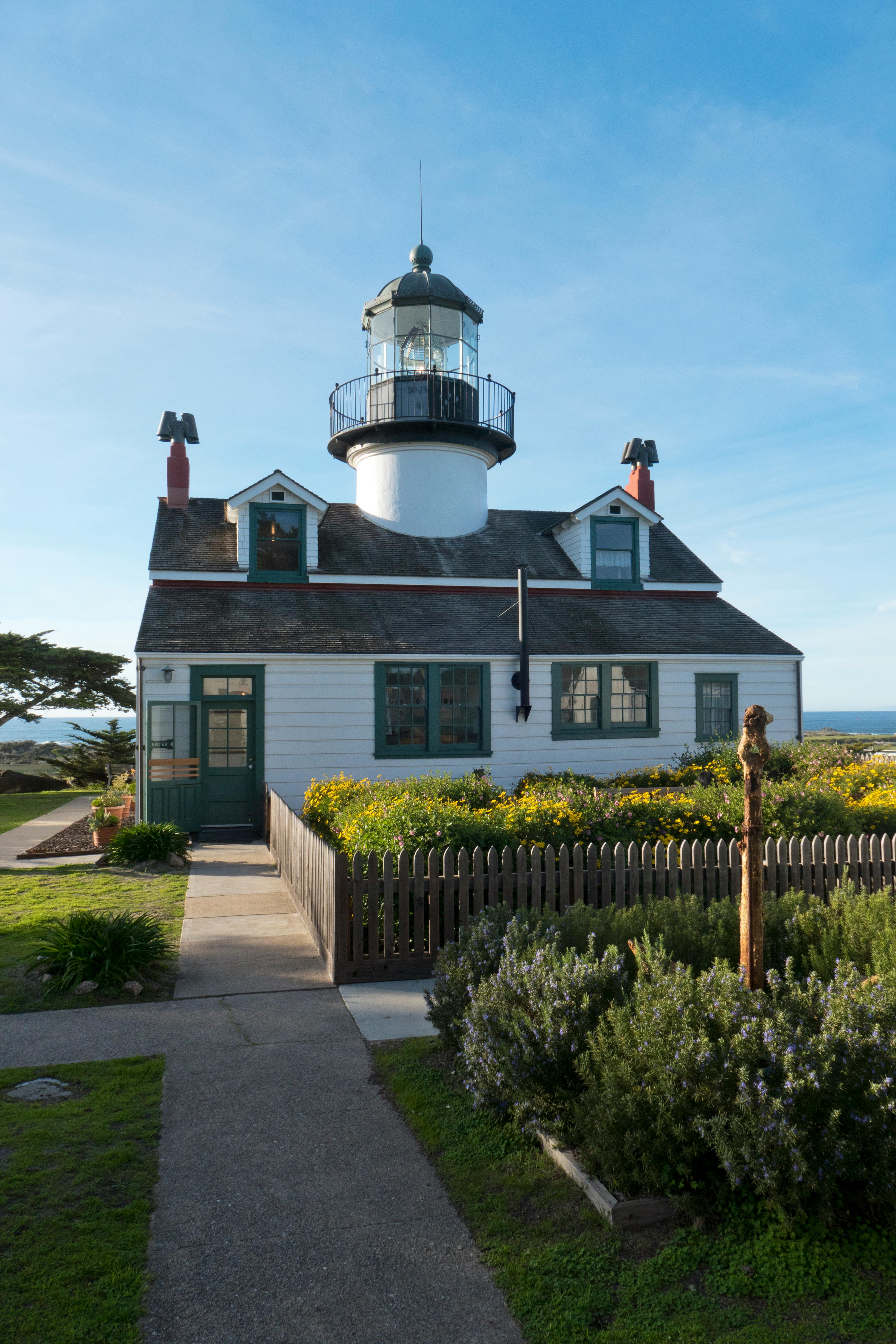 Small Cottage under Lighthouse · Free Stock Photo