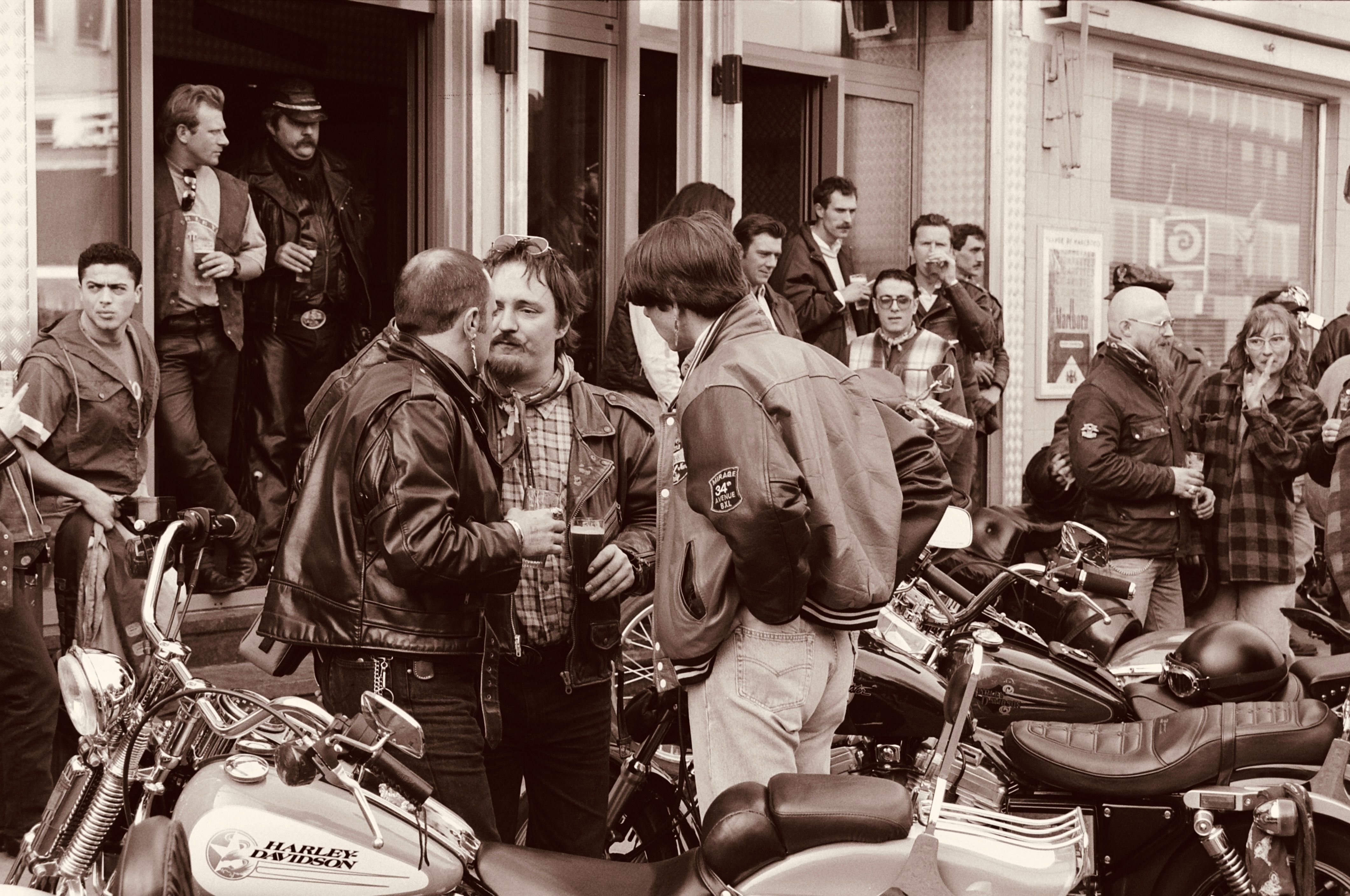 Photo of Motorcyclists Meeting in front of a Building · Free Stock Photo