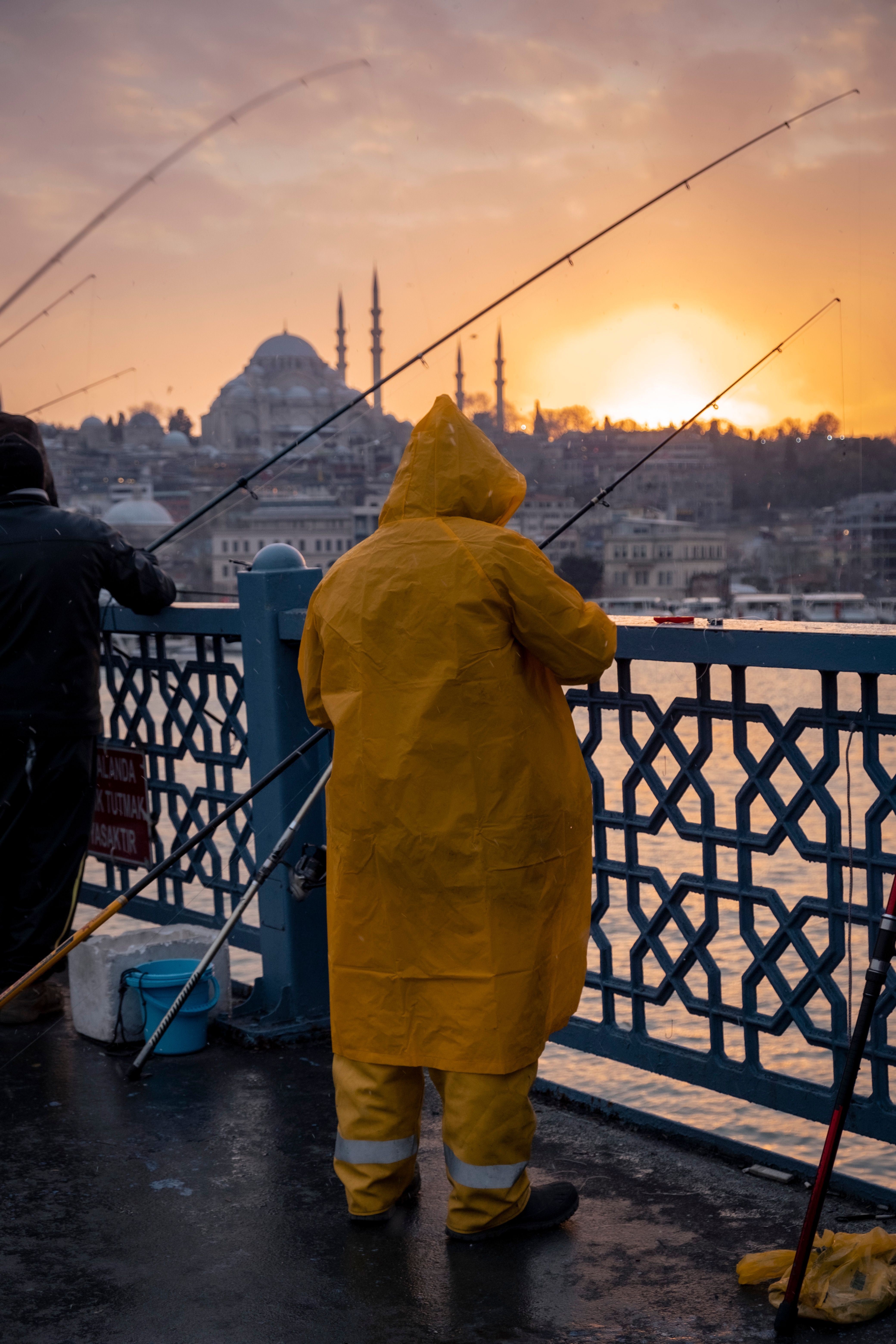 A Man Fishing from the Bridge over the Bosphorus Strait in Istanbul ...