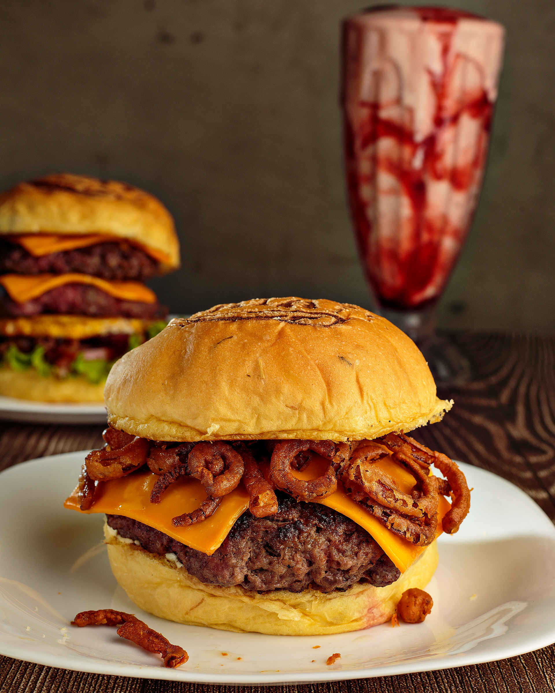 Close-up of Large Beef Burgers and a Milkshake · Free Stock Photo