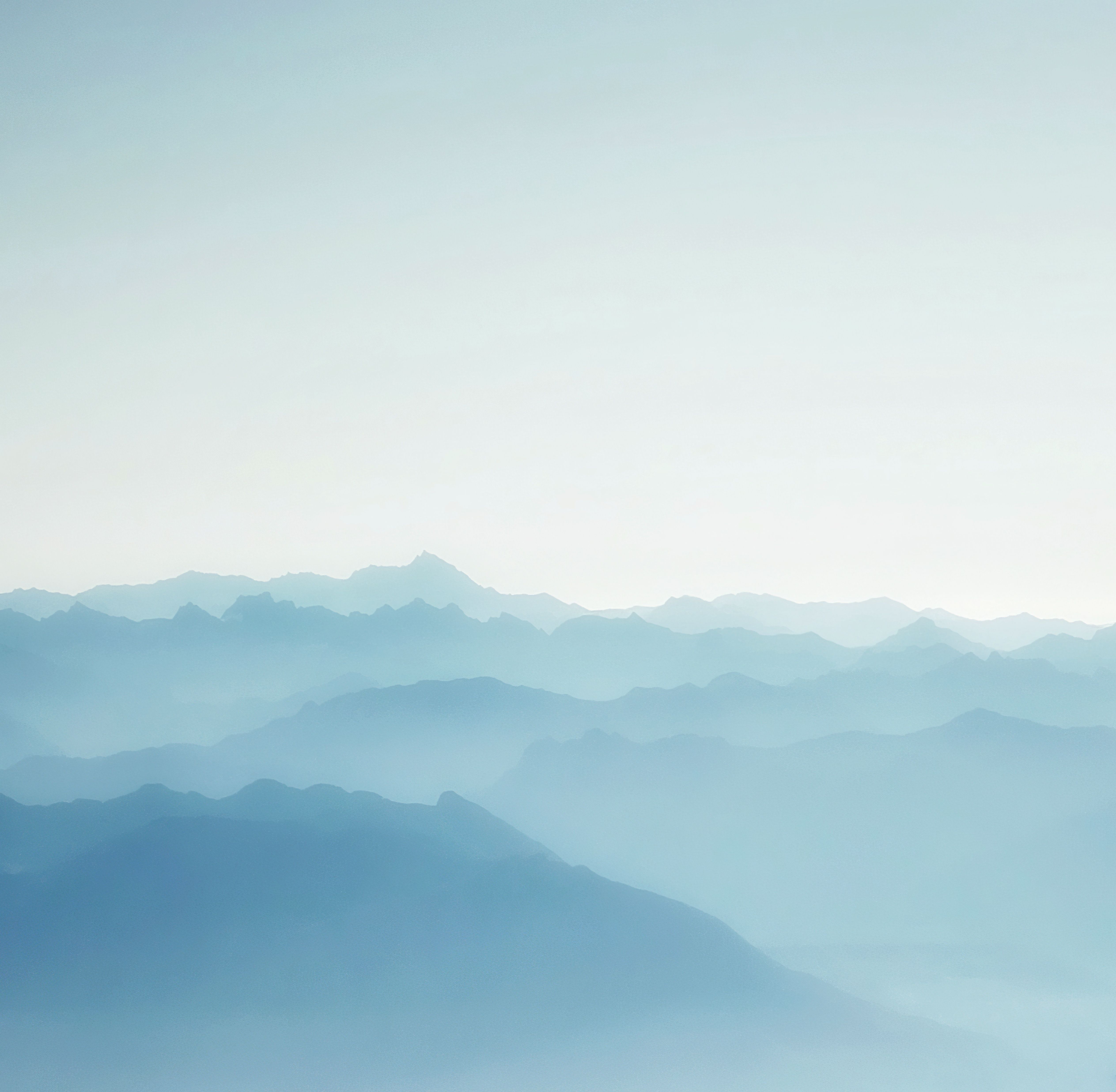 Scenic Panorama of a Hilly Valley at Sunrise · Free Stock Photo