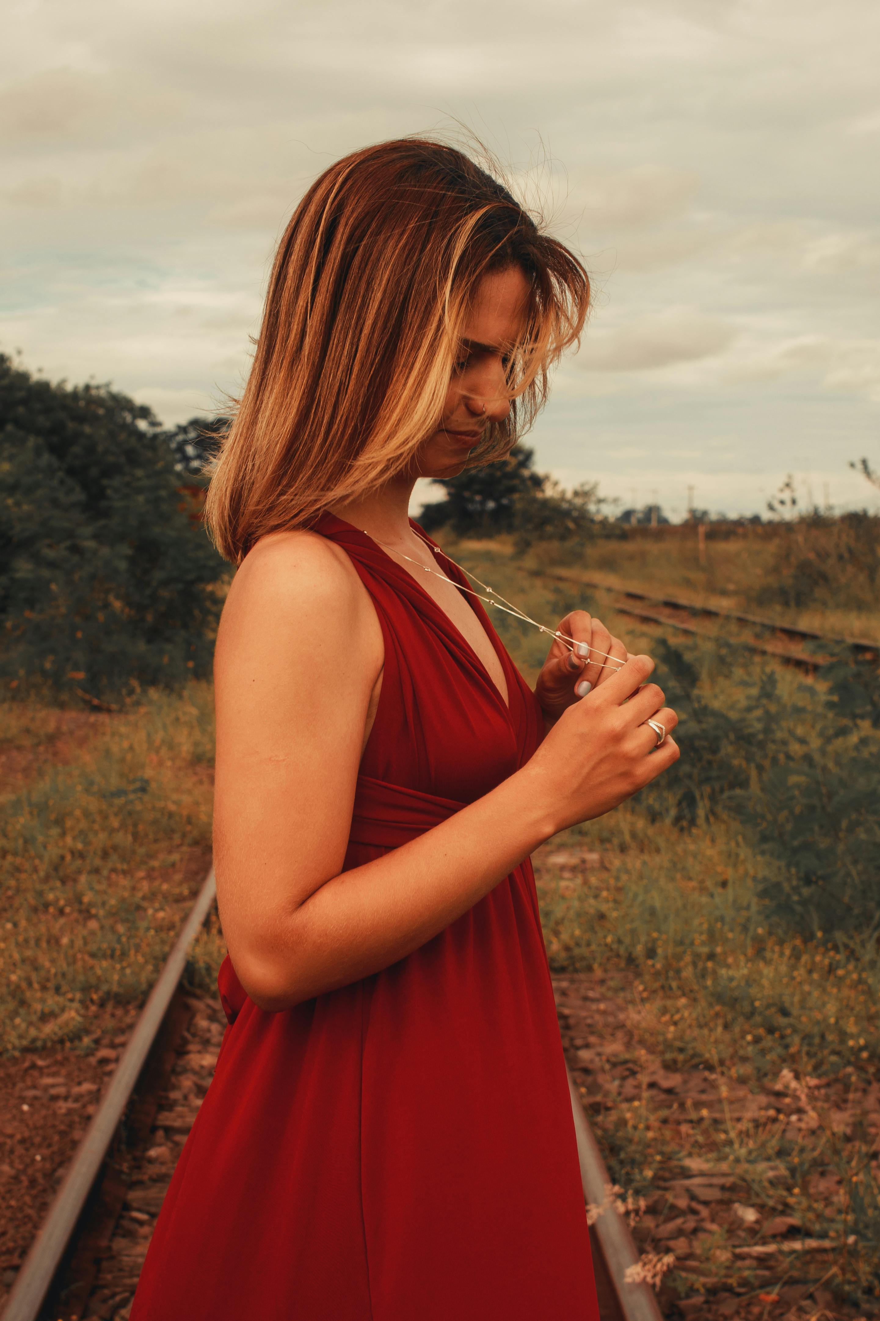 Woman Posing in Skirt on Platform · Free Stock Photo