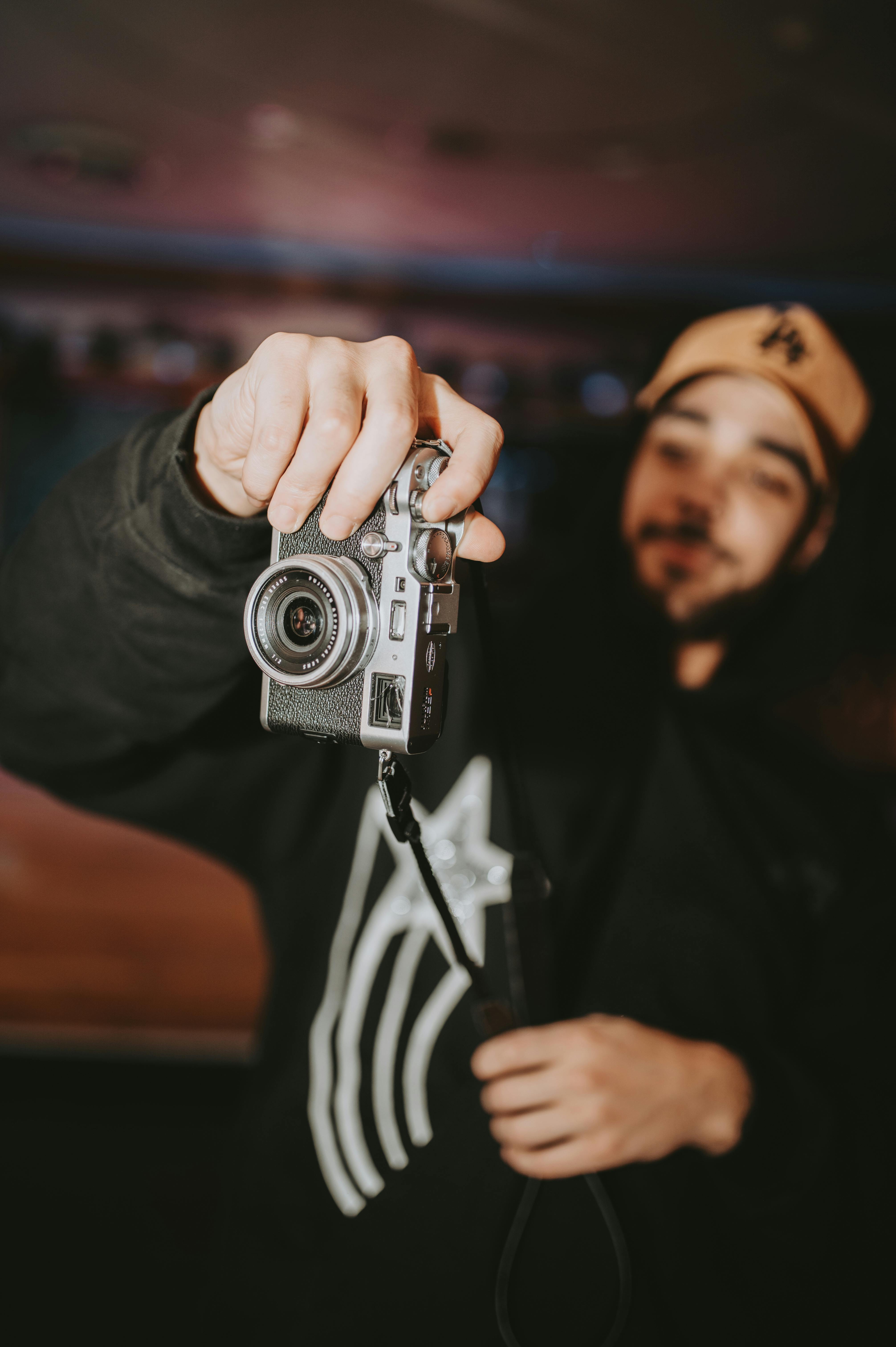 Photographer with two cameras · Free Stock Photo