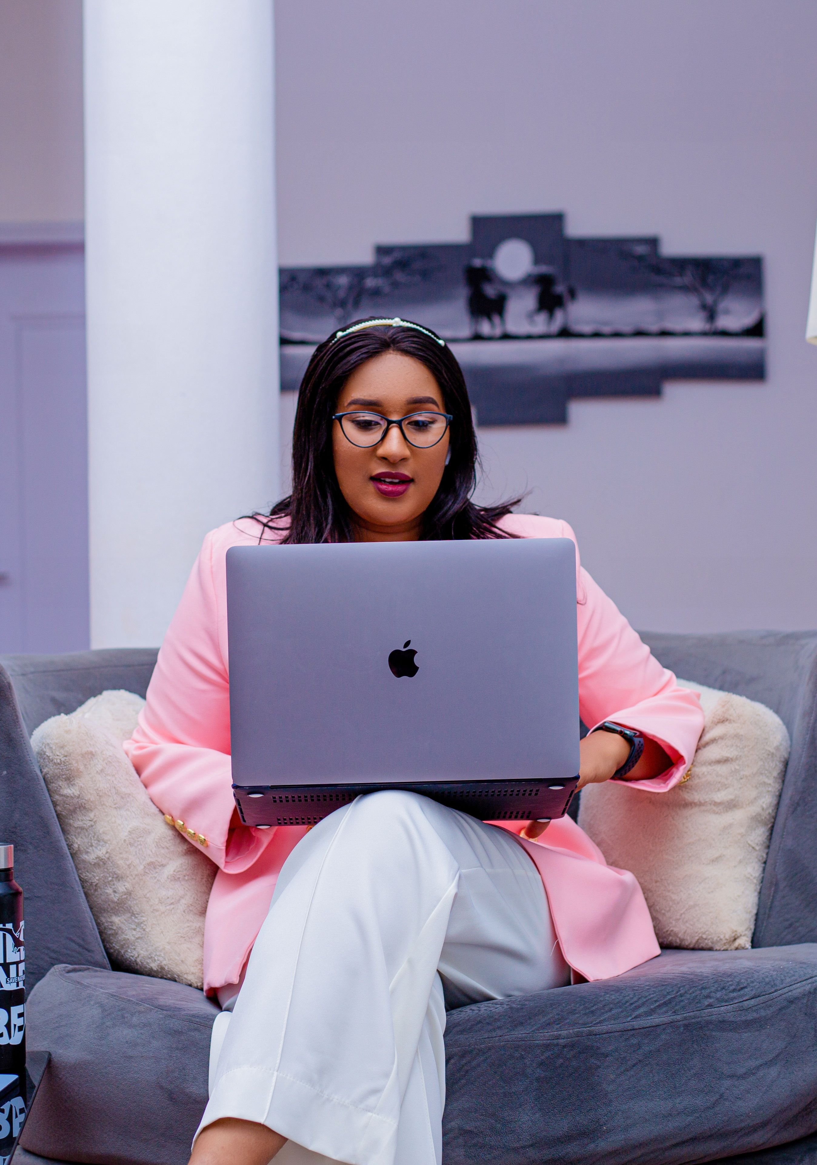 Sitting Woman Using Apple MacBook · Free Stock Photo