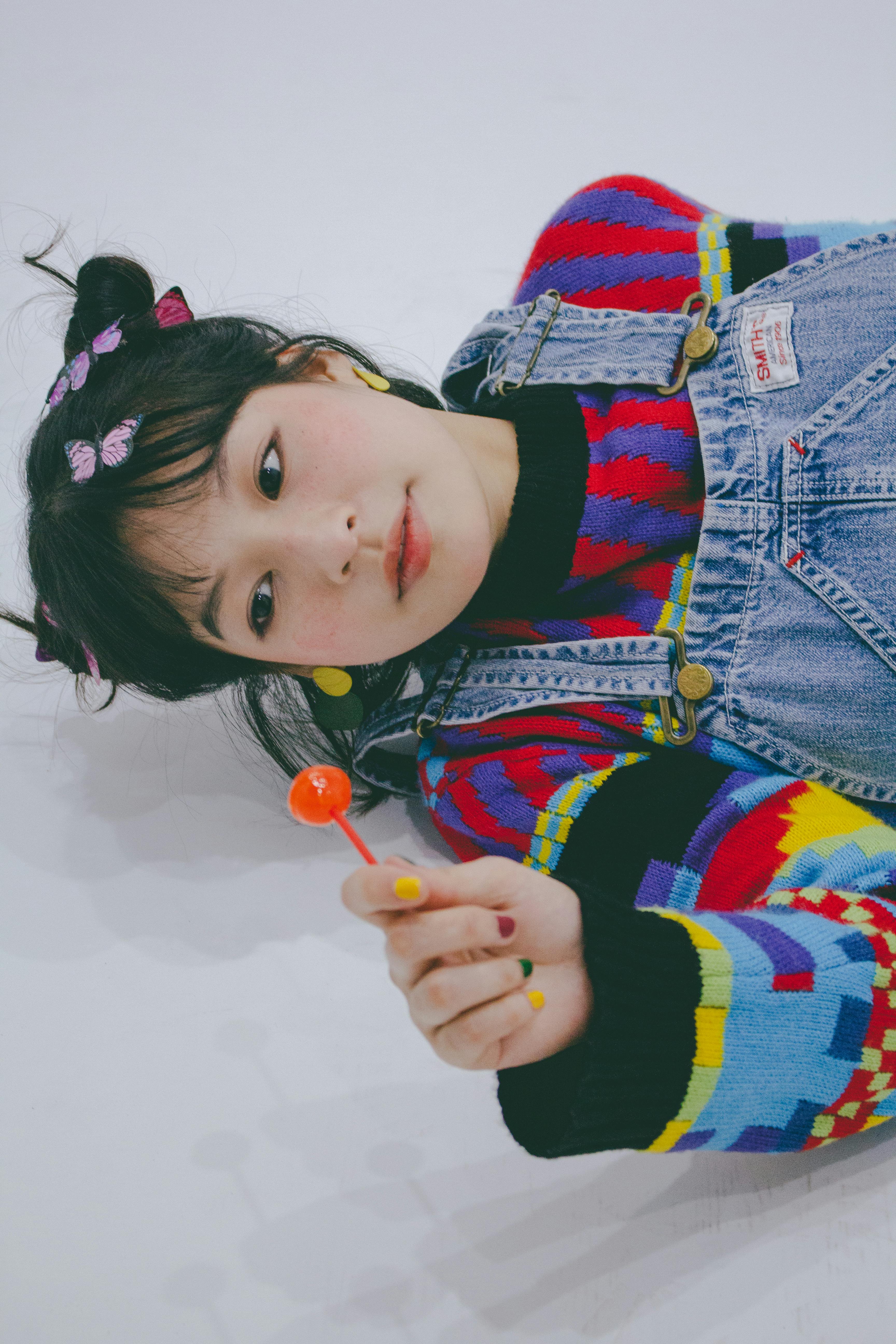 Woman Posing with Lollipop · Free Stock Photo