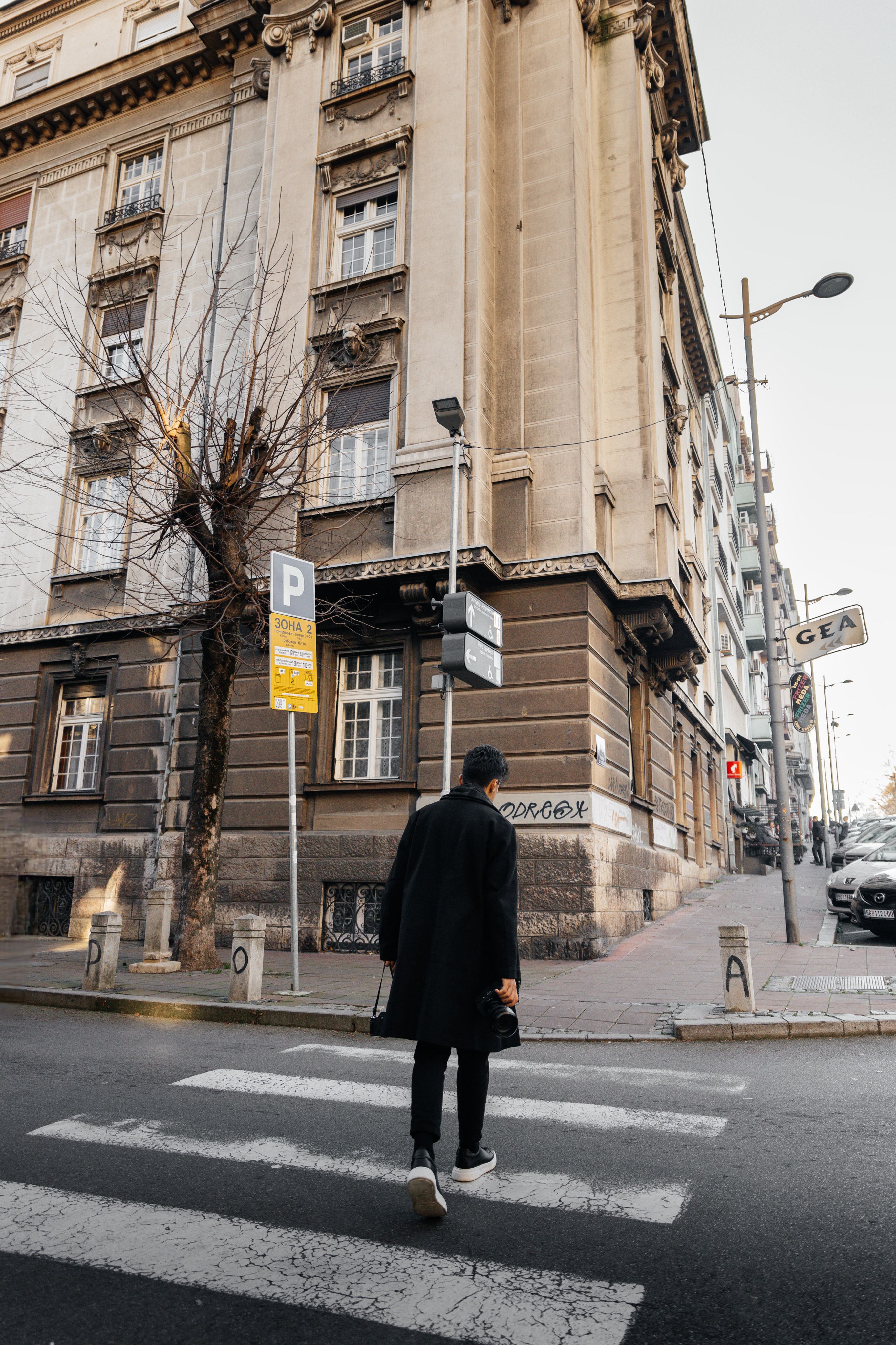 Man Walking on the Crosswalk · Free Stock Photo