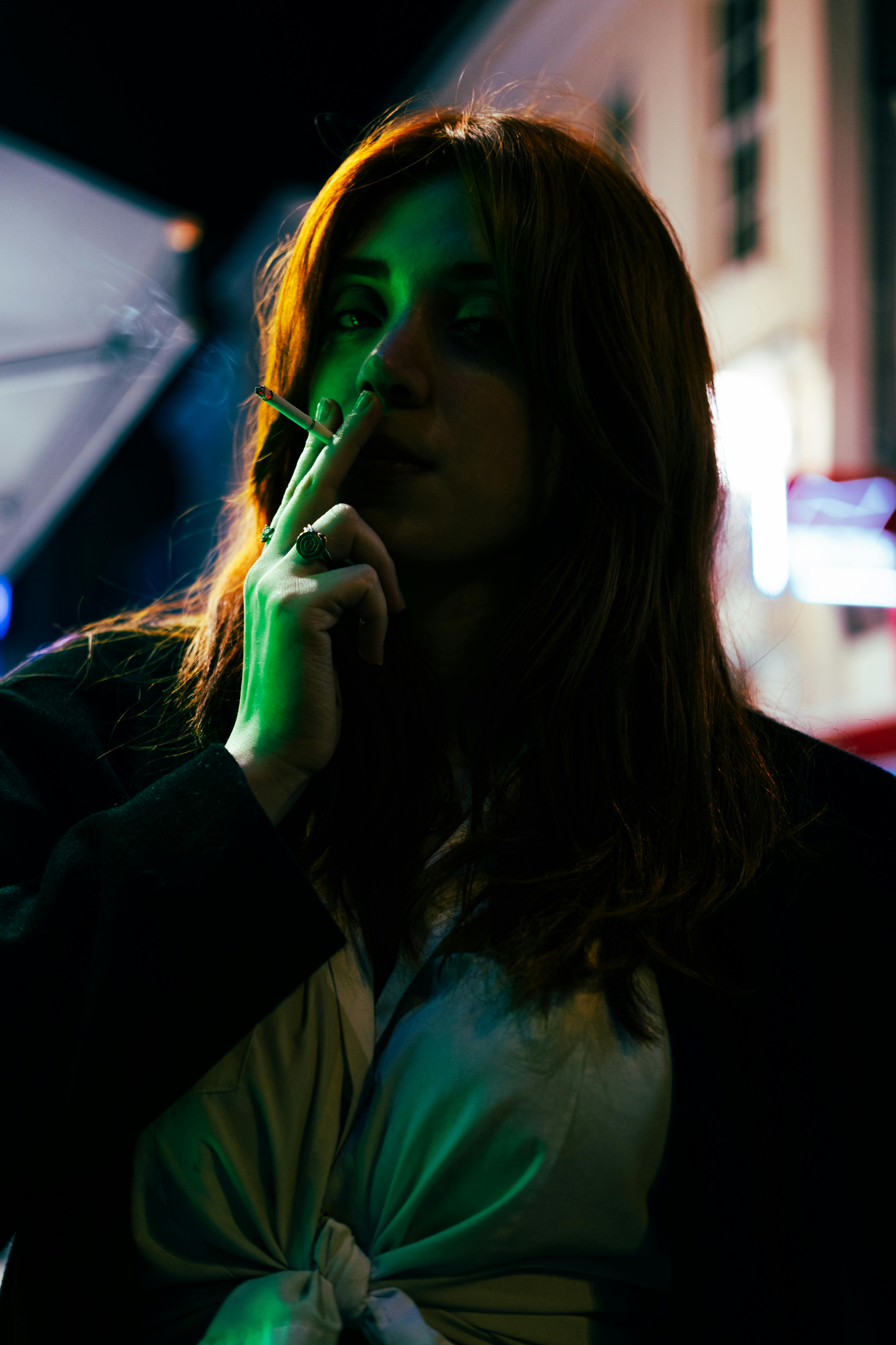 Woman Smoking at Night · Free Stock Photo