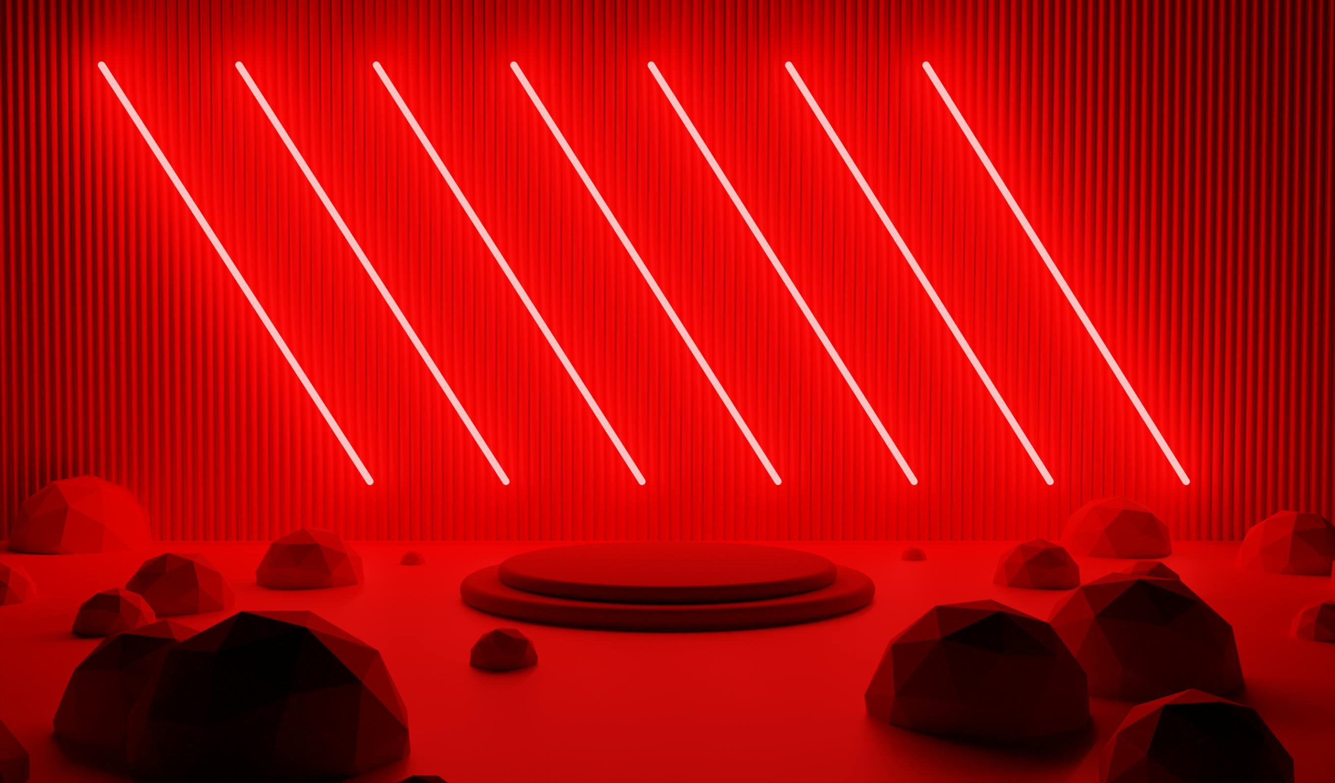 Red neon light in a dark room with rocks · Free Stock Photo