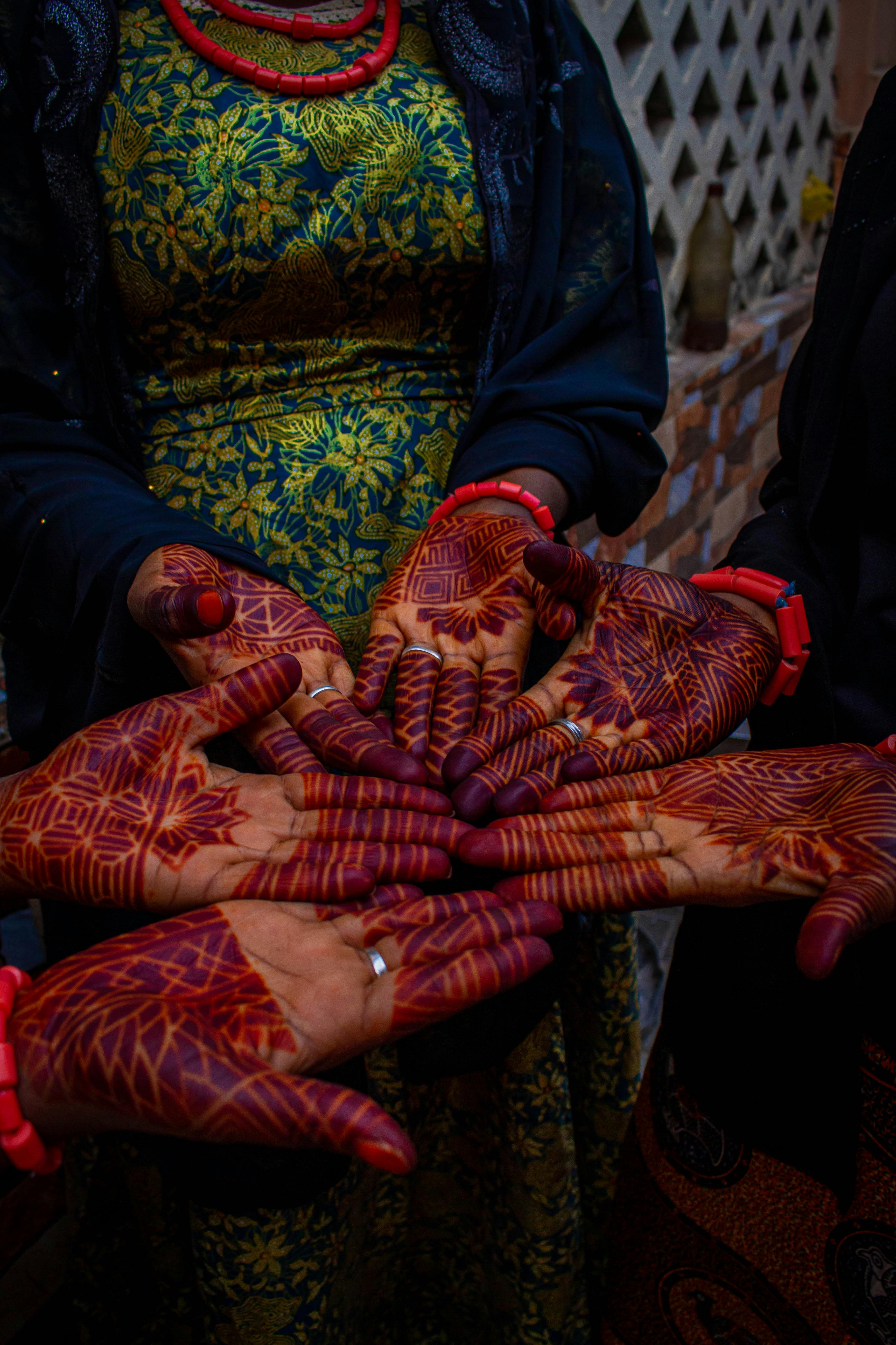 Hands Painted in Red Symbols for Ceremony · Free Stock Photo