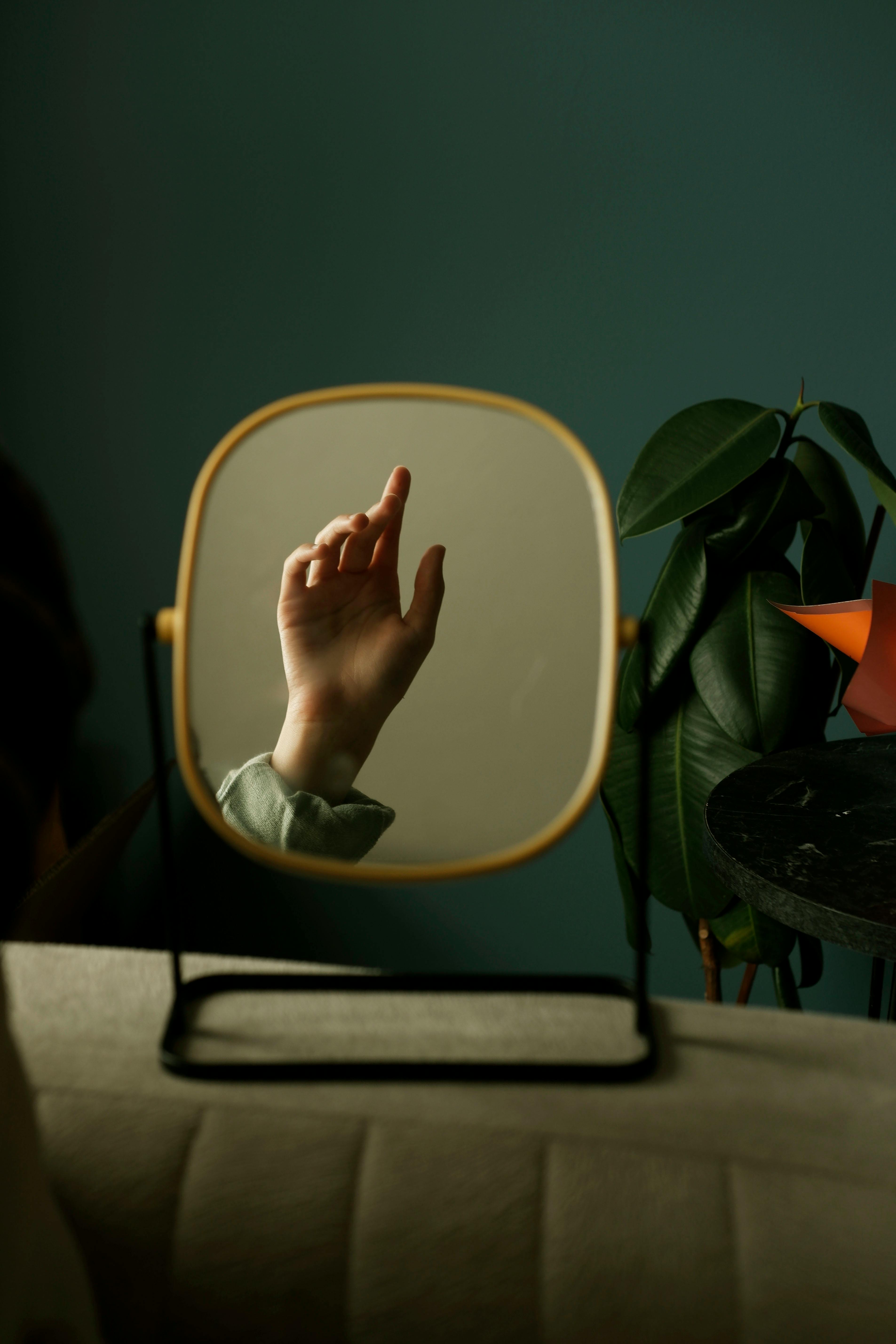 Hand Reflecting in a Mirror · Free Stock Photo
