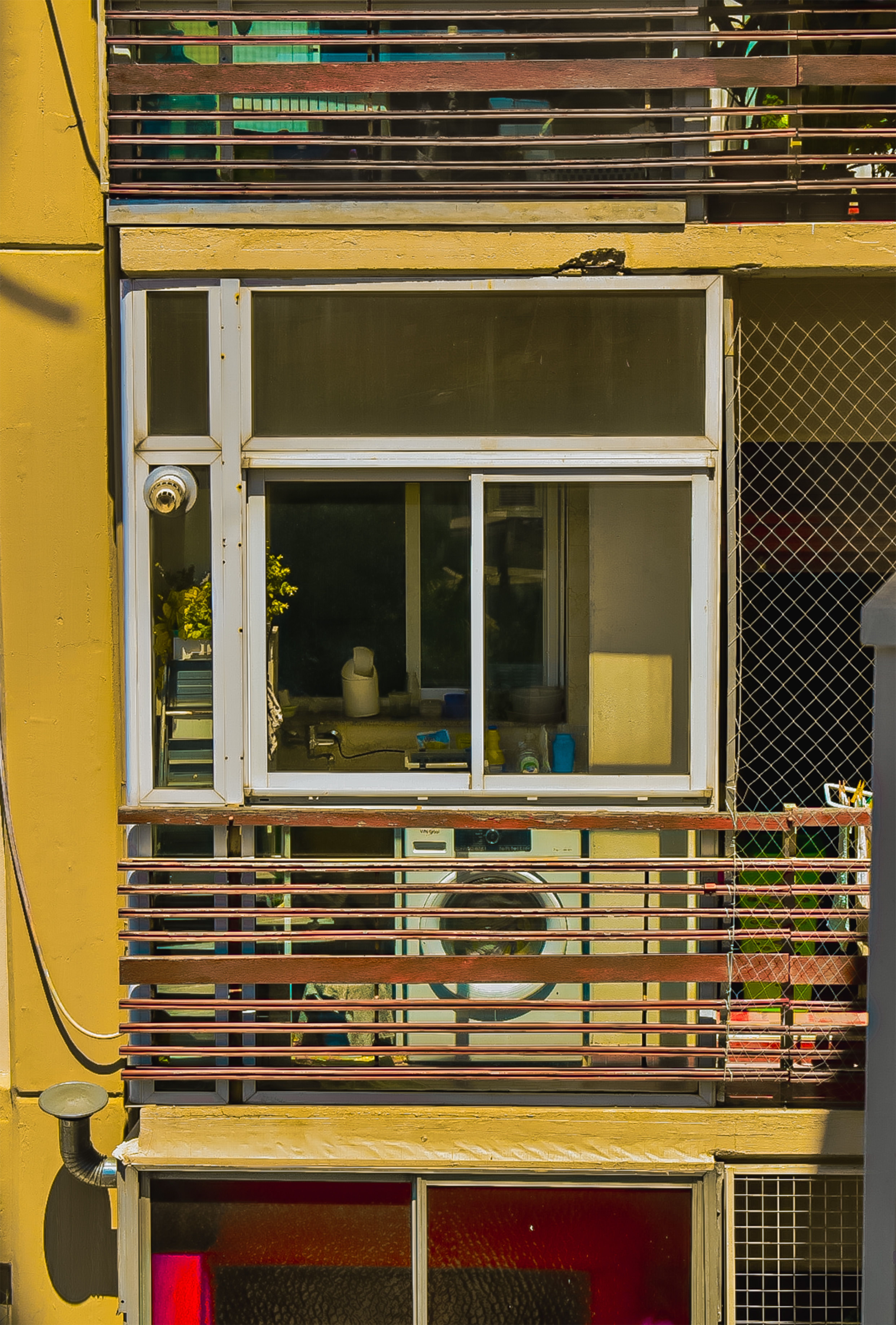 Window Installed on the Balcony Converted Into a Laundry Room · Free ...