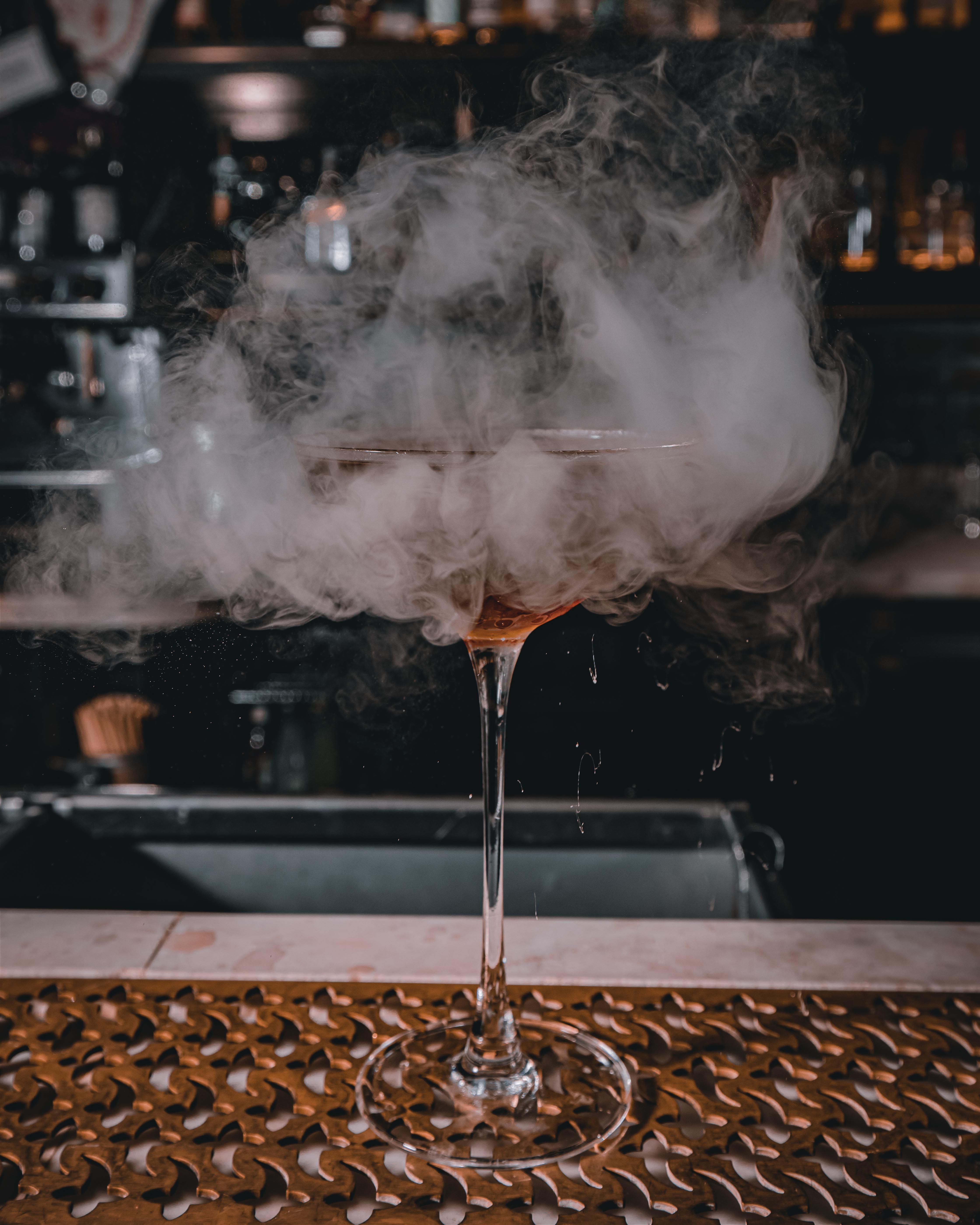 Steaming Cocktail on Bar Counter · Free Stock Photo