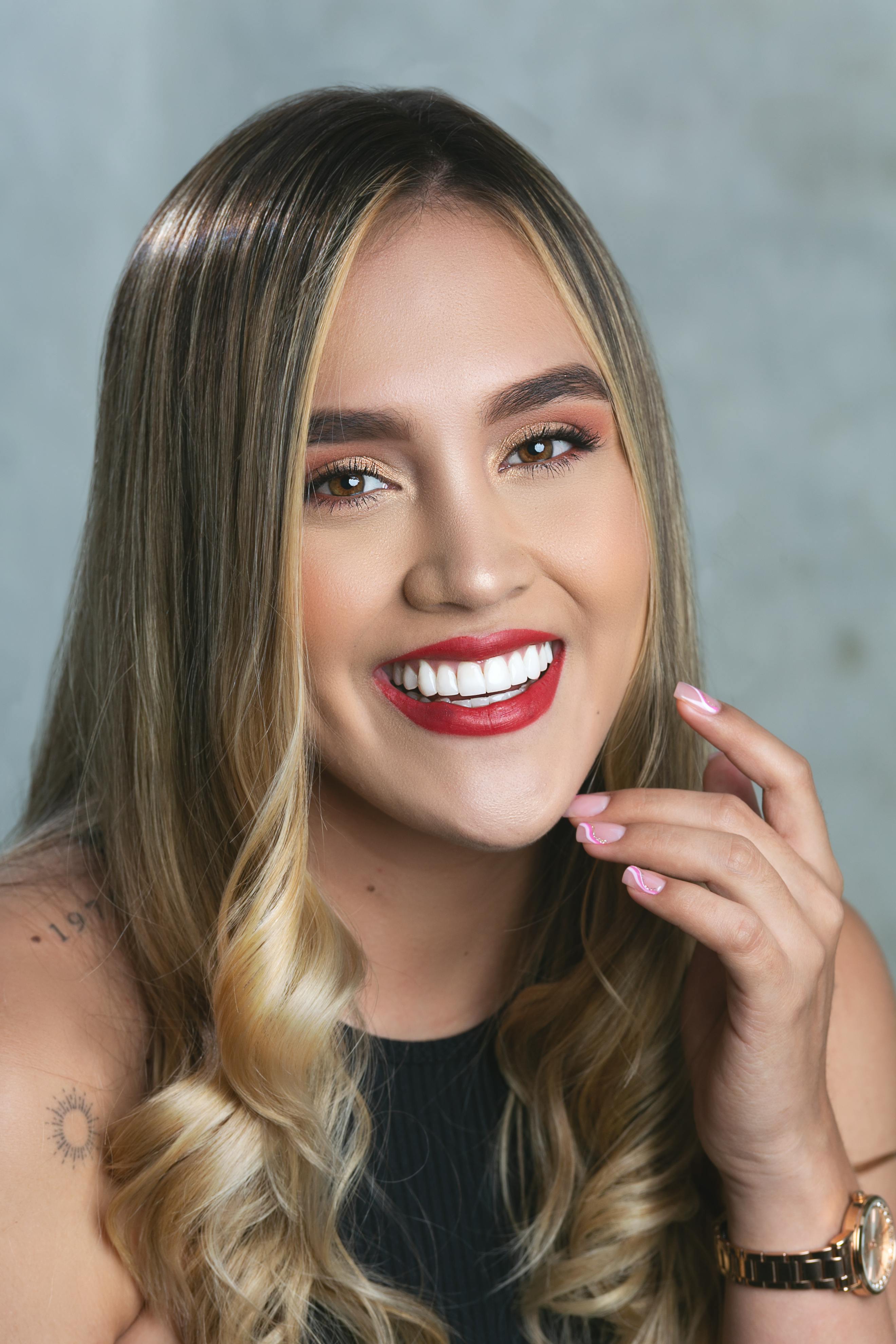Female Fashion Model Posing in a Red Leather Dress · Free Stock Photo