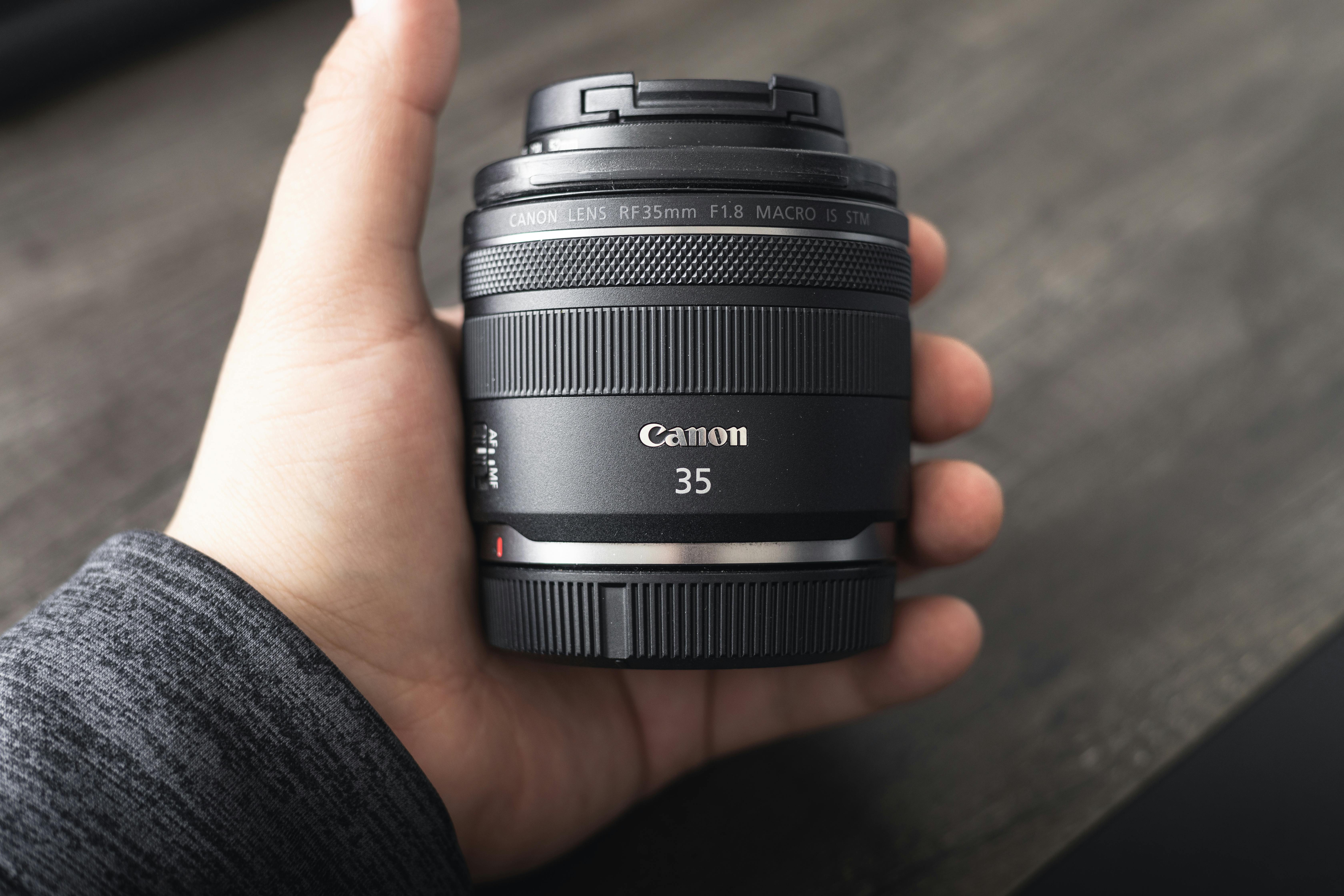Hand Holding Camera Lens · Free Stock Photo