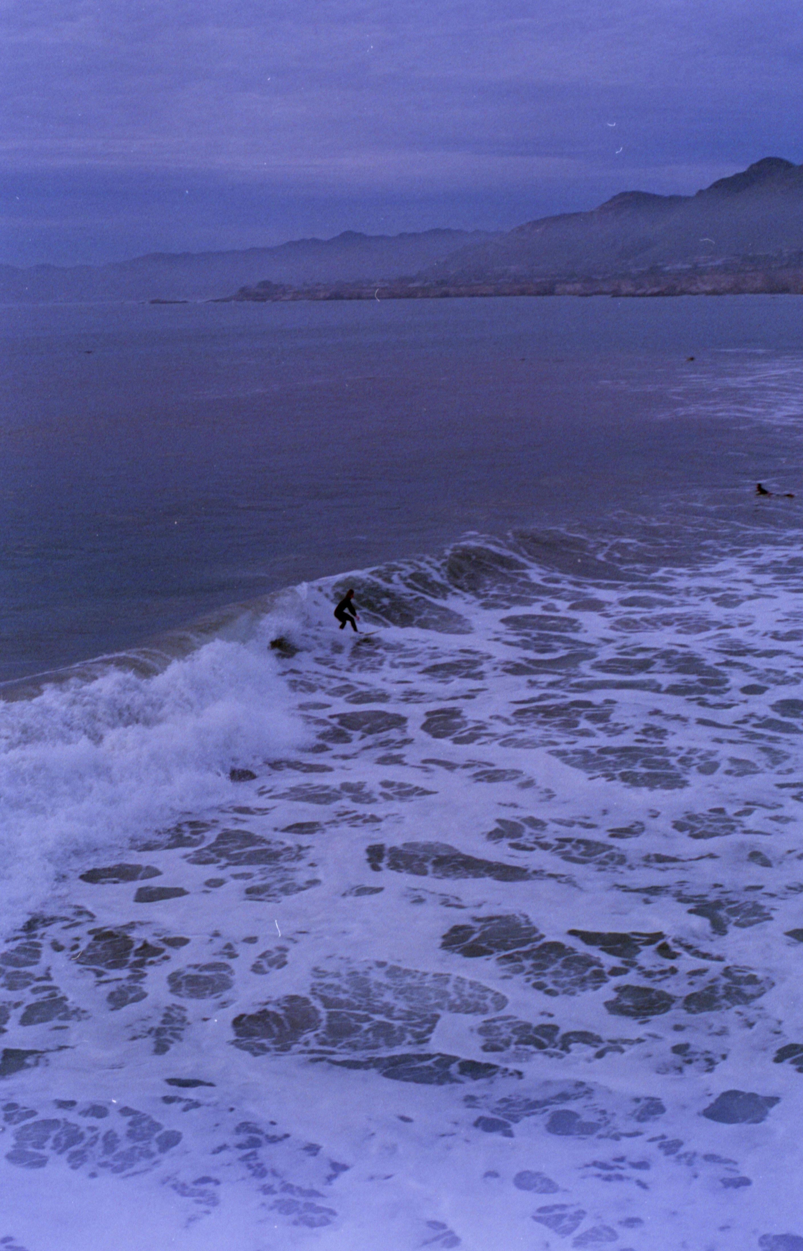 Waves Splashing on Rocks on Beach on Dusk · Free Stock Photo