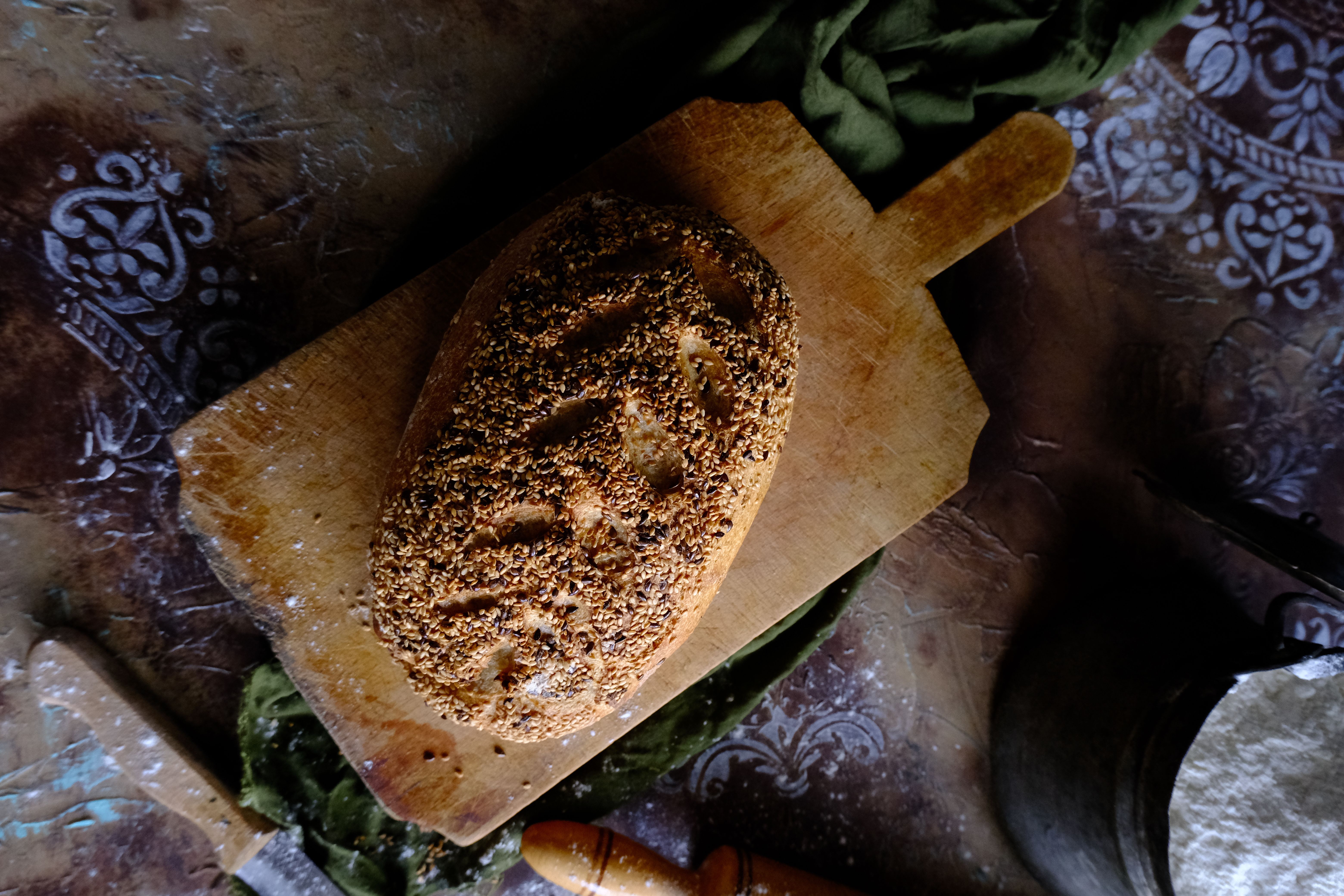 Fresh Baked Bread on Wooden Board · Free Stock Photo