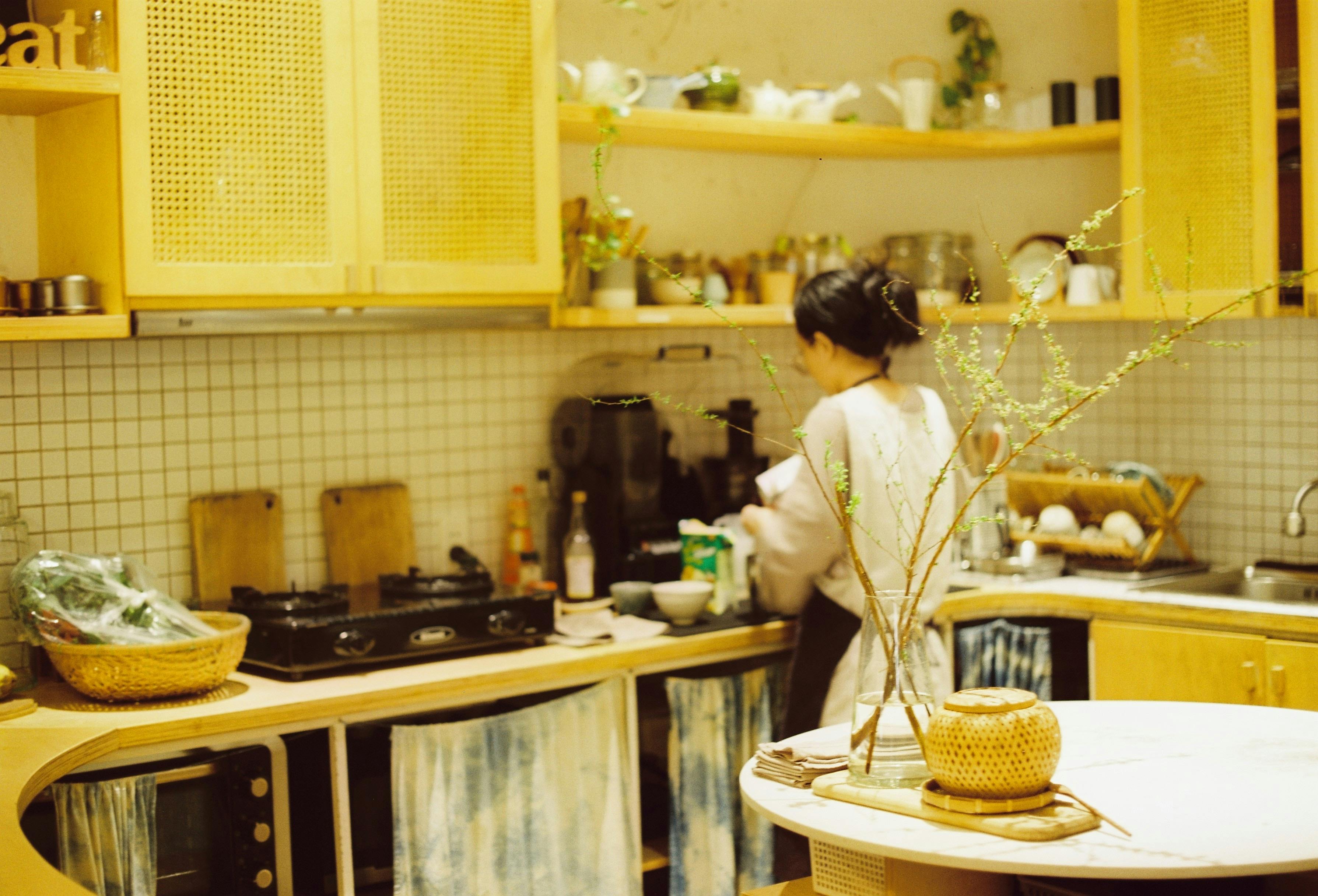 Woman Working in Kitchen · Free Stock Photo