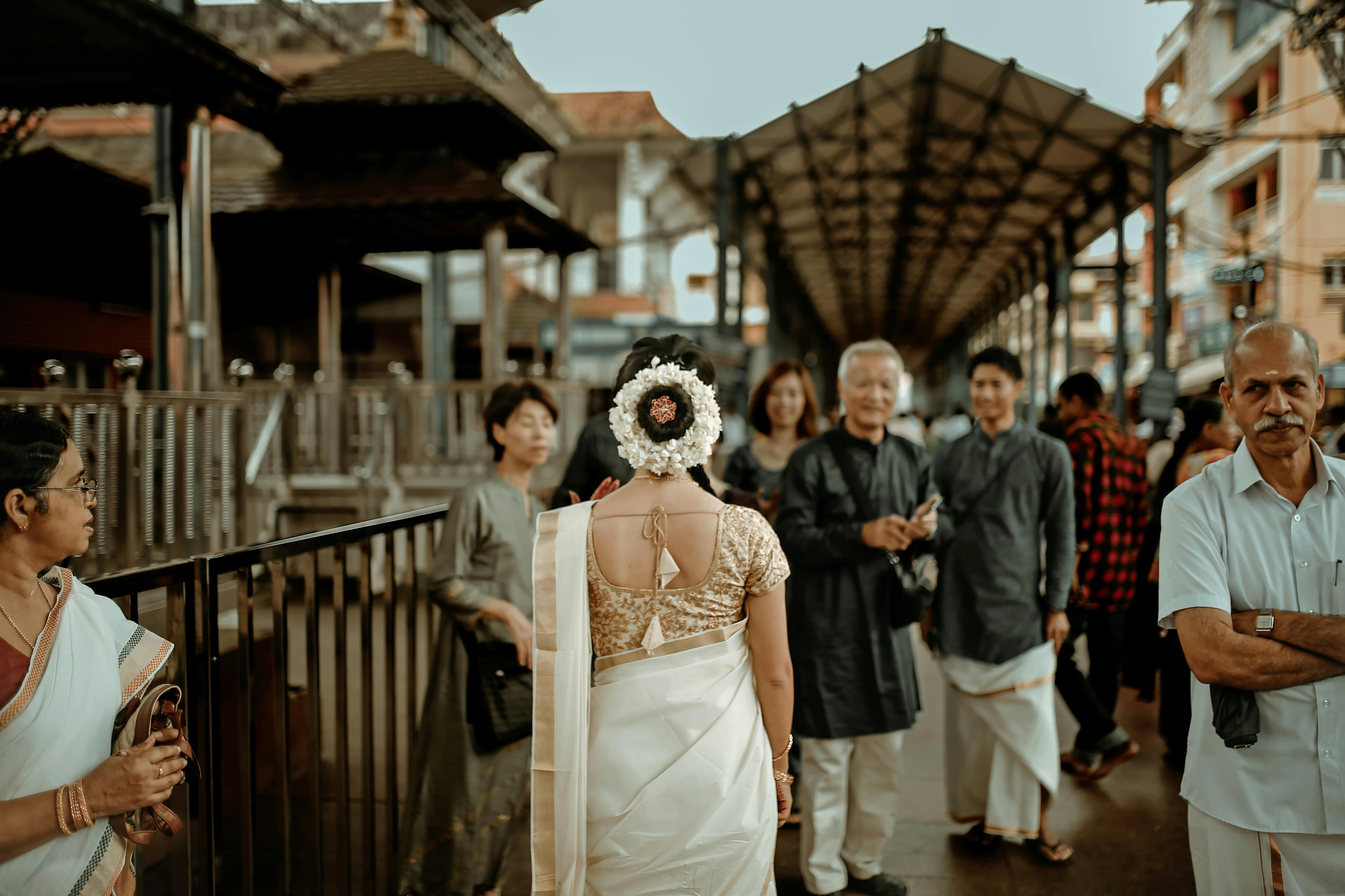 A Woman Wearing a Black Robe Standing in Front of Al Sahaba Mosque ...