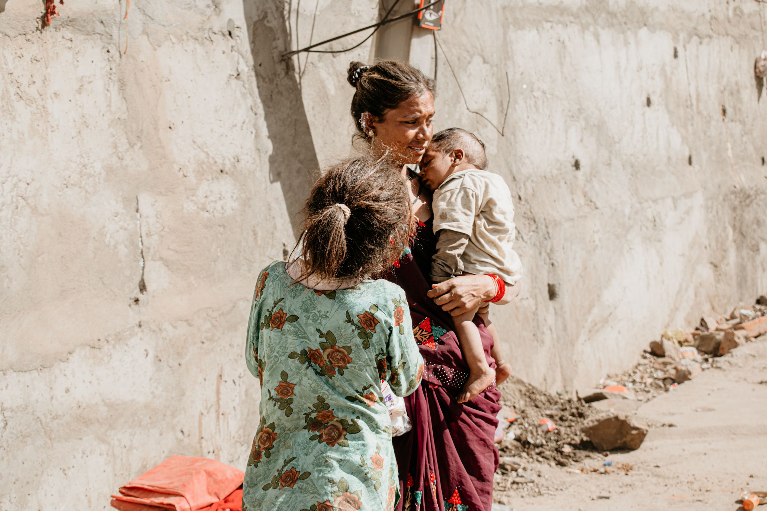 Indian Mother Protecting Child From Dust Photos, Download The BEST Free ...