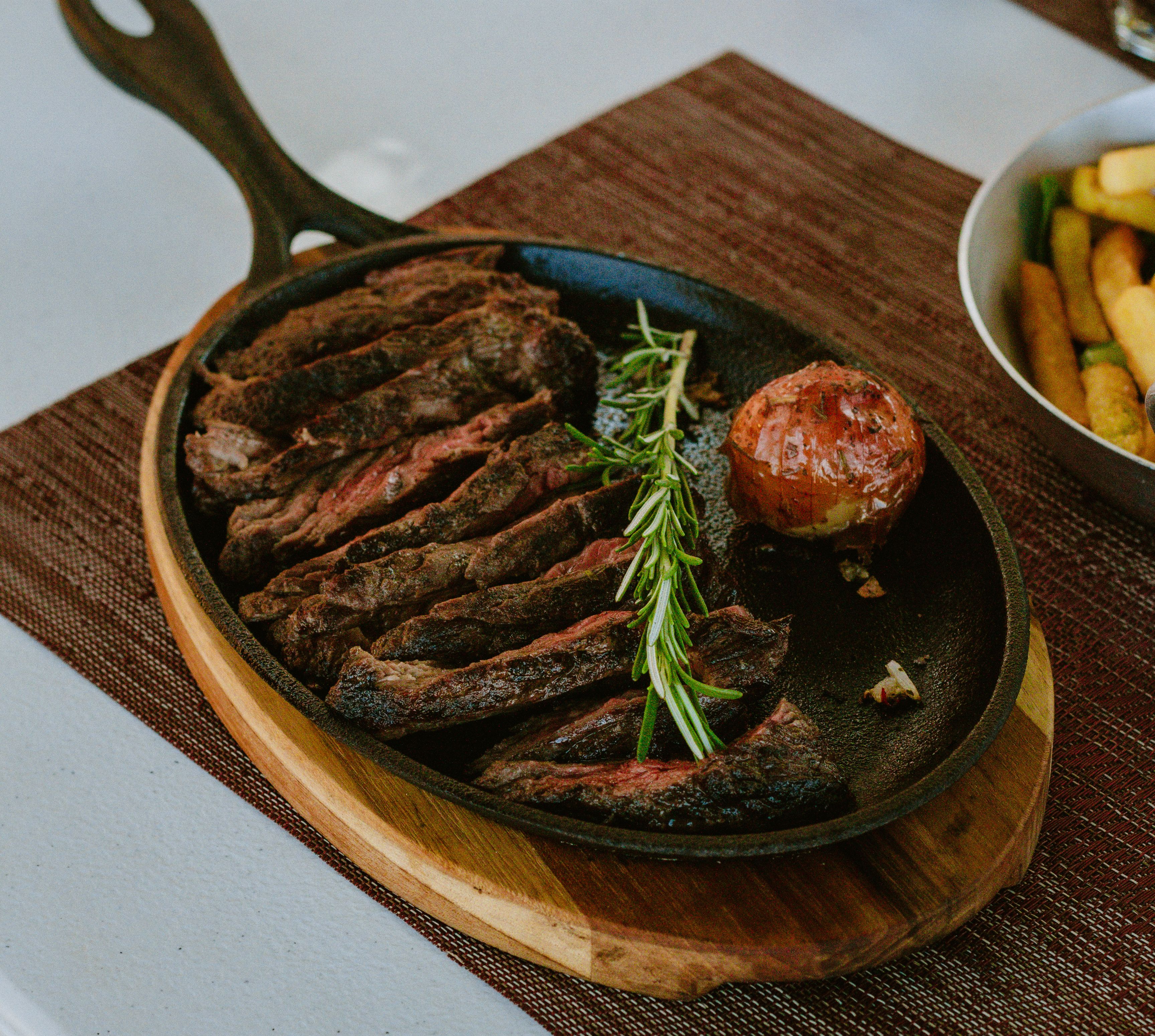 Ready-to-Eat Meat with Rice on a Frying Pan · Free Stock Photo