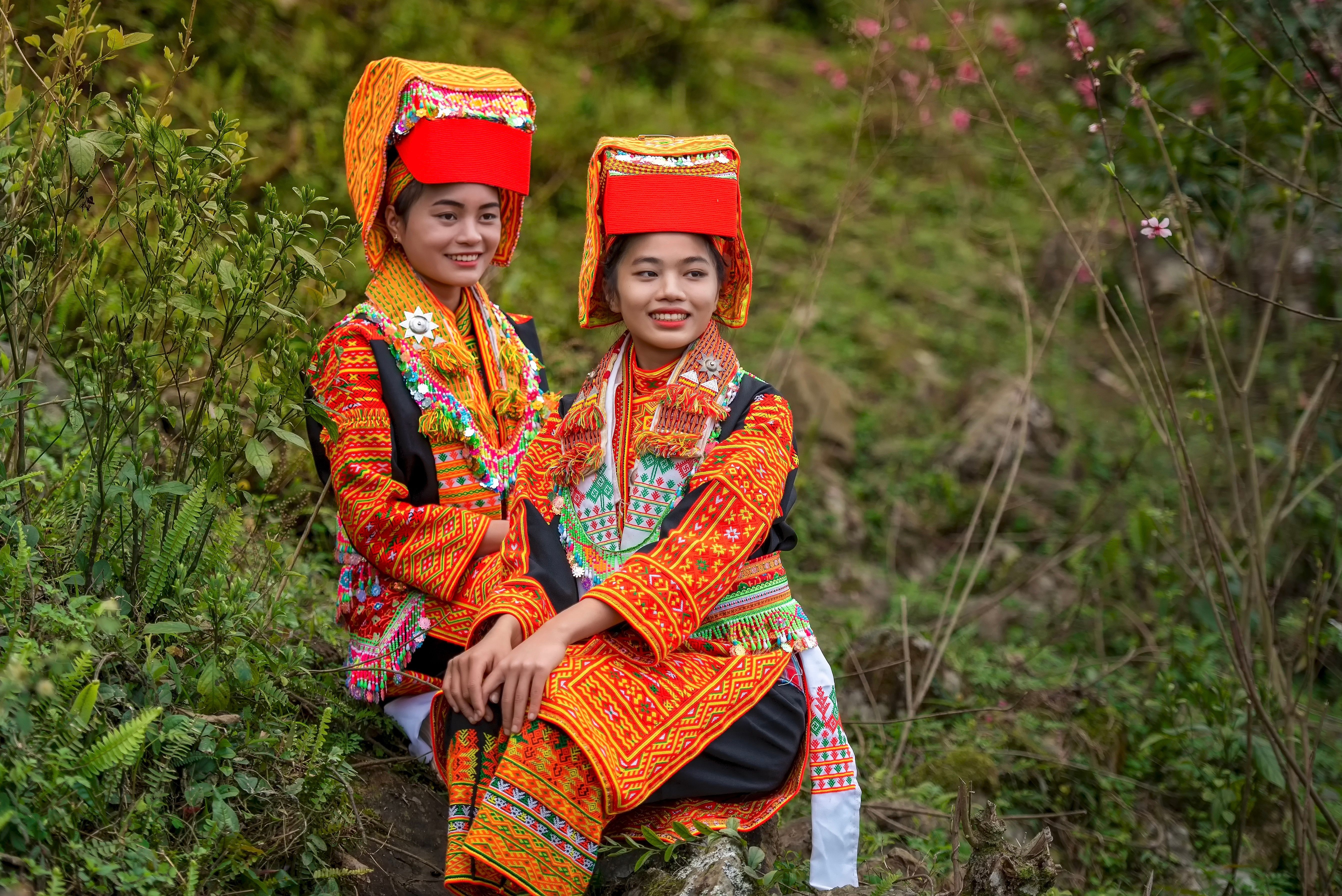 Women Posing in Traditional Clothing · Free Stock Photo
