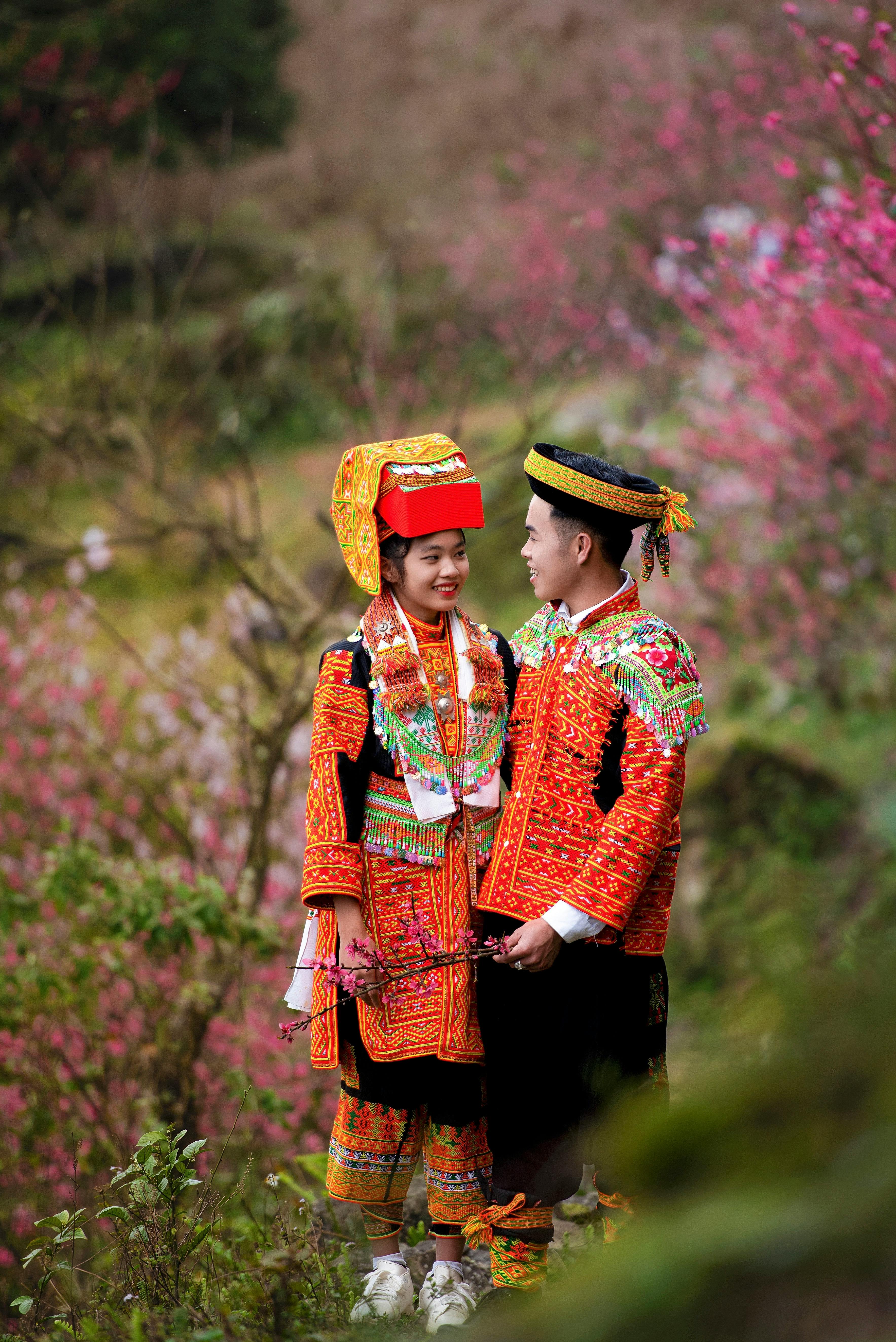 A Couple in Traditional Clothing · Free Stock Photo