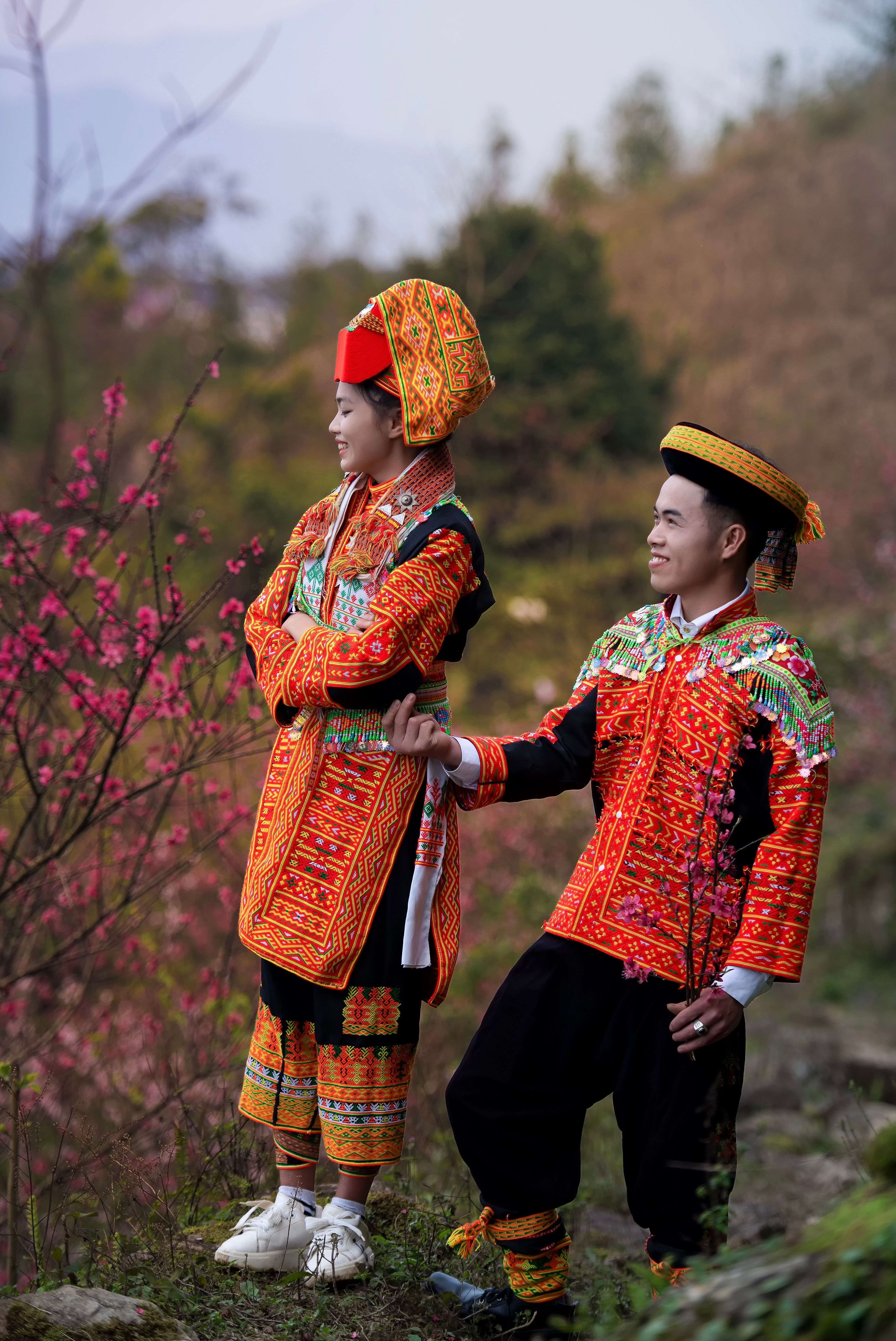 Man and Woman Wearing Traditional Colorful Clothing · Free Stock Photo