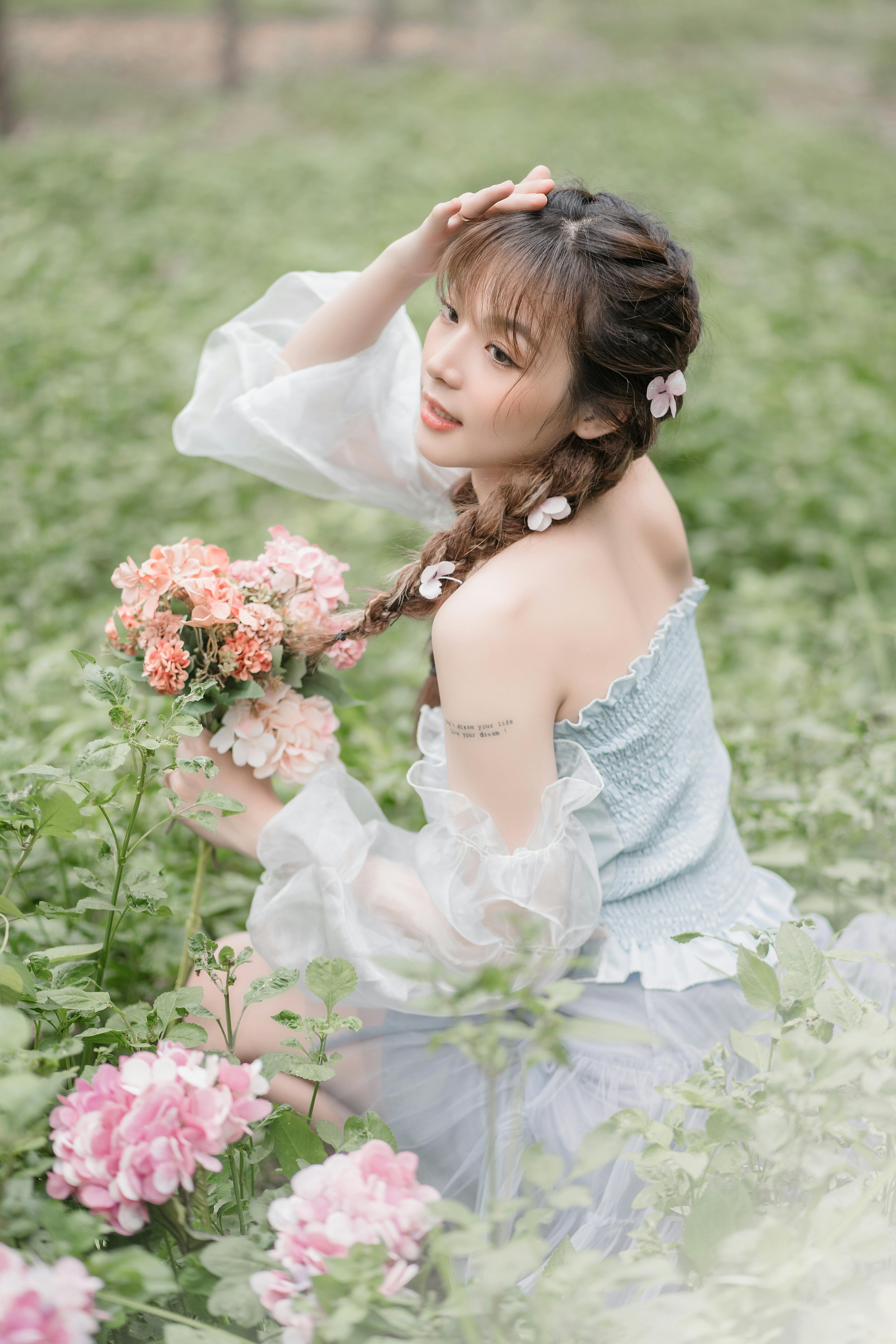 Model in Glove Posing with Roses · Free Stock Photo