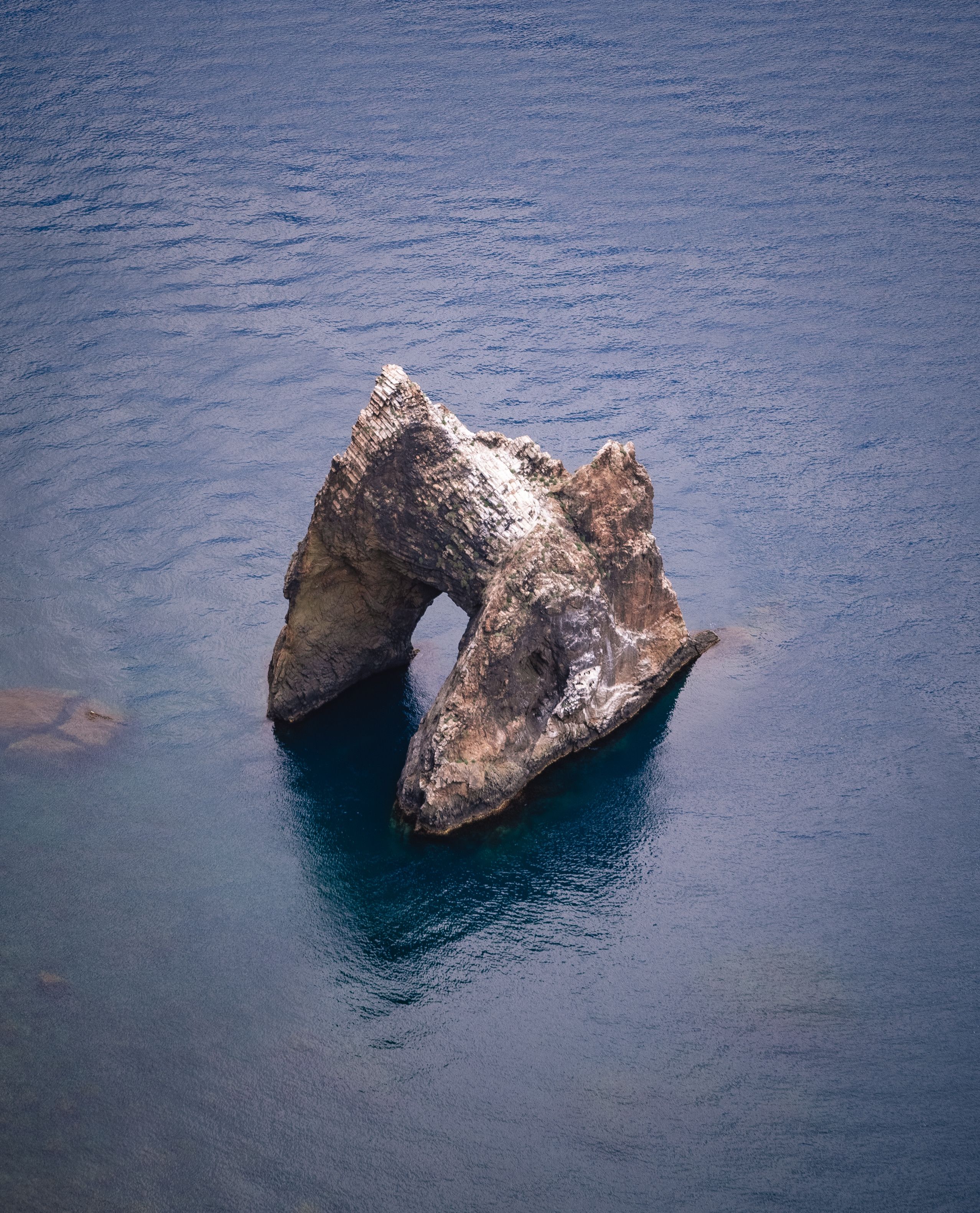 Rocks Forming Arch on Beach · Free Stock Photo