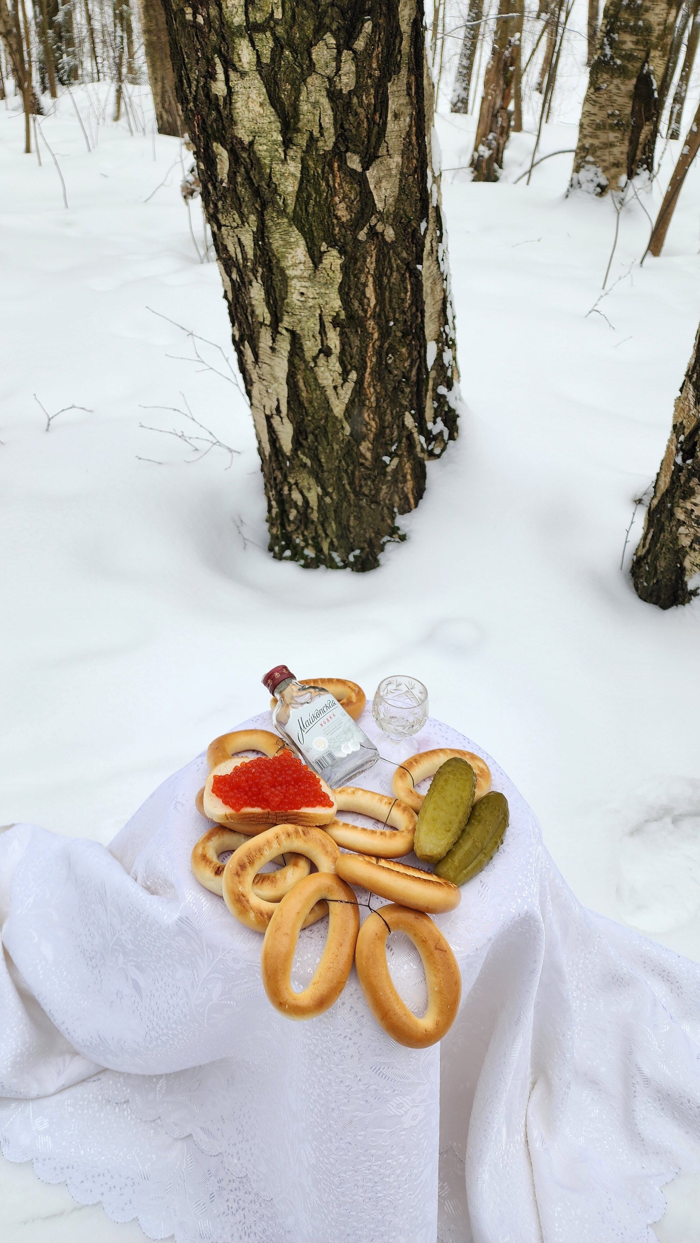Food on a Little Table Outdoors in Snow · Free Stock Photo