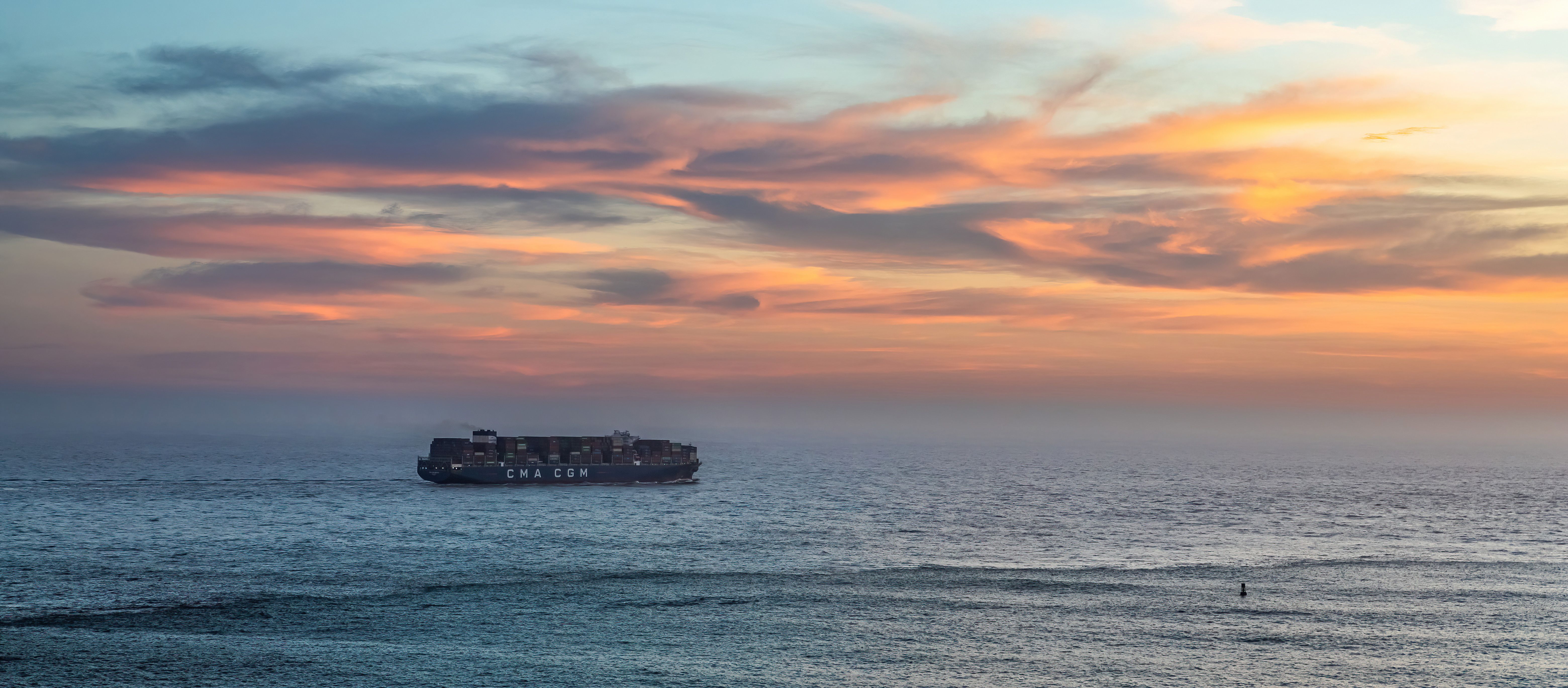 Container Ship at Sunset · Free Stock Photo