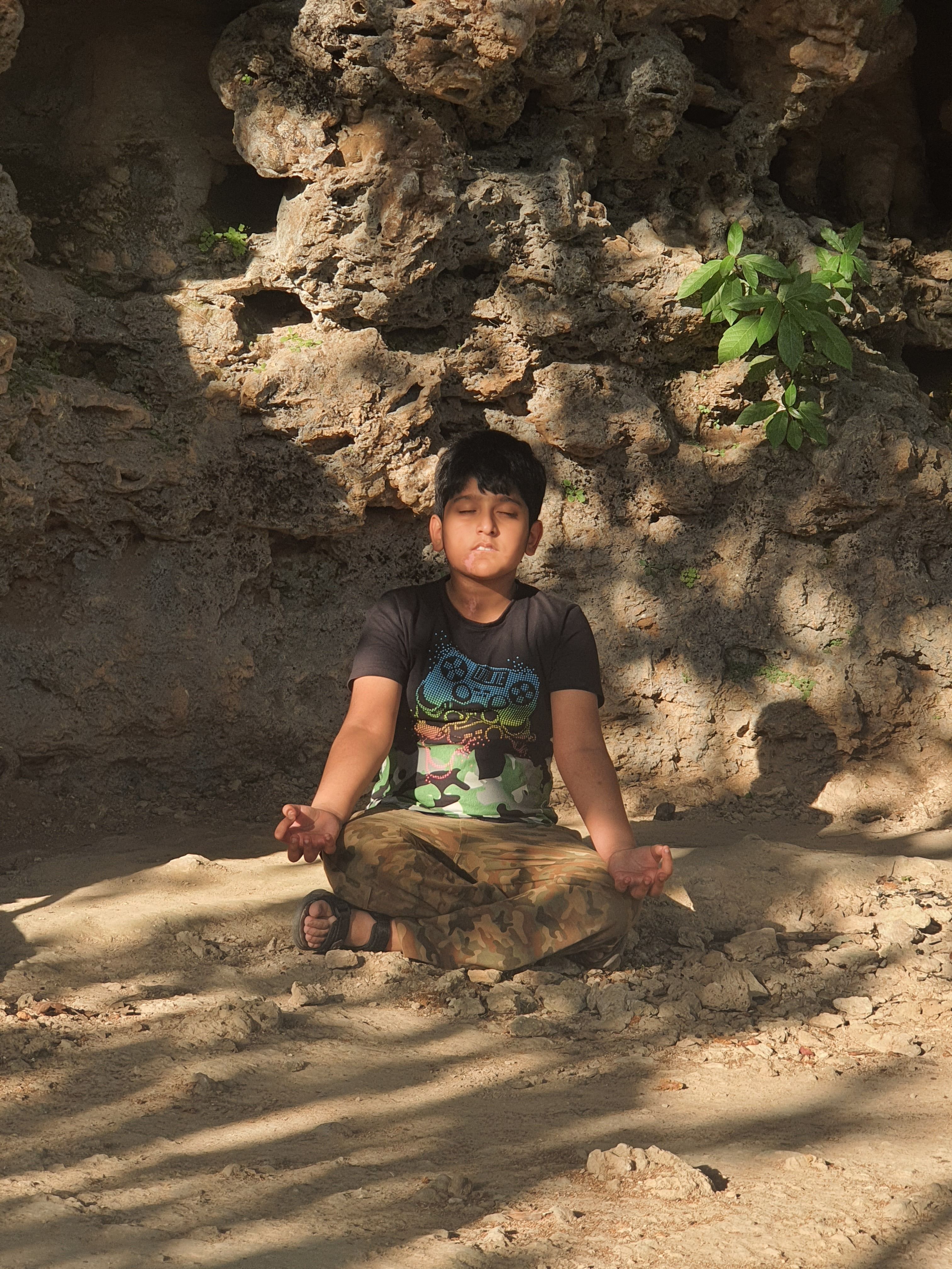 Sitting Boy Meditating · Free Stock Photo