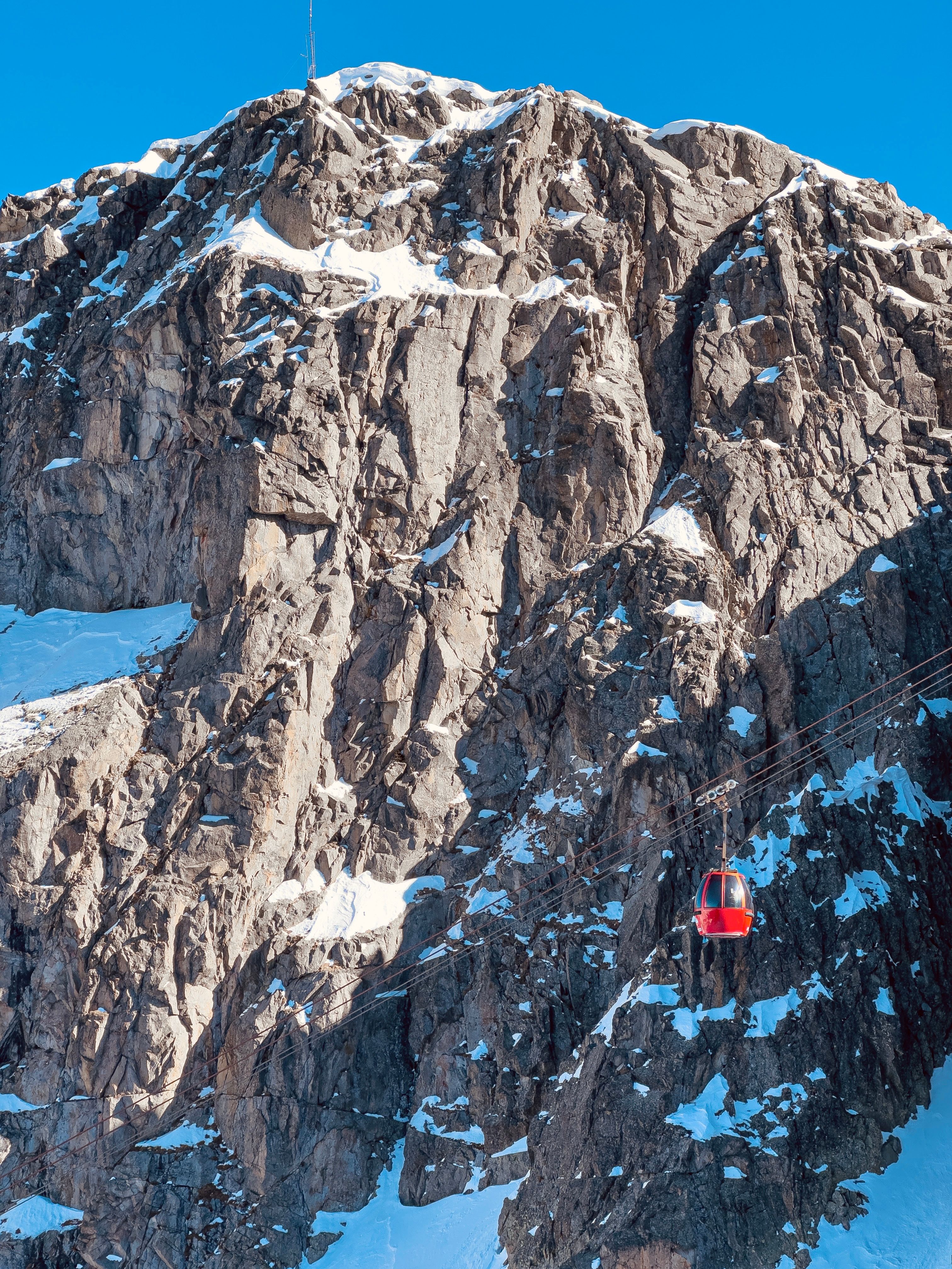 Red Cable Car against Mountains · Free Stock Photo