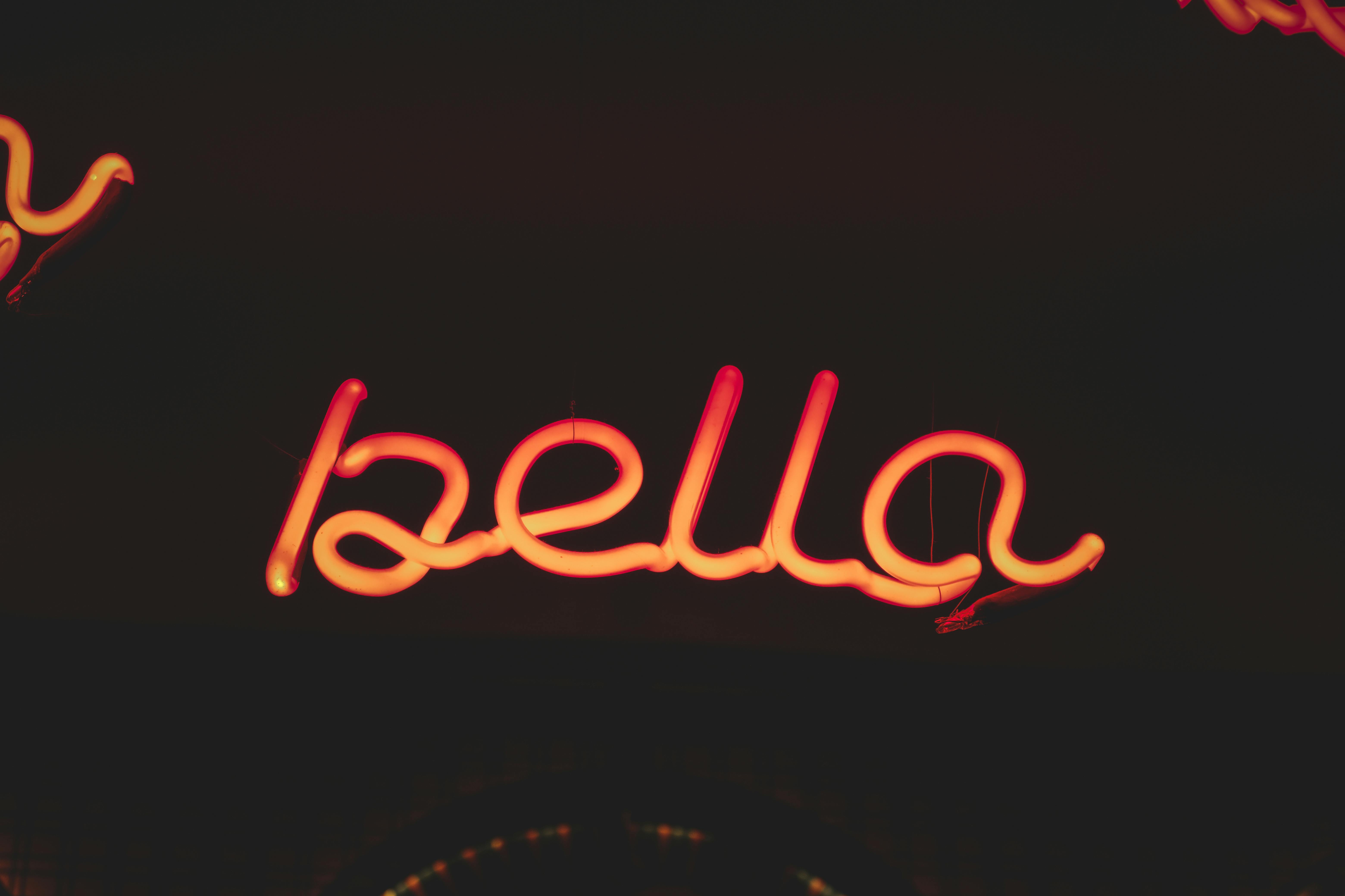 Close-up of Light Neon Sign on Black Background · Free Stock Photo