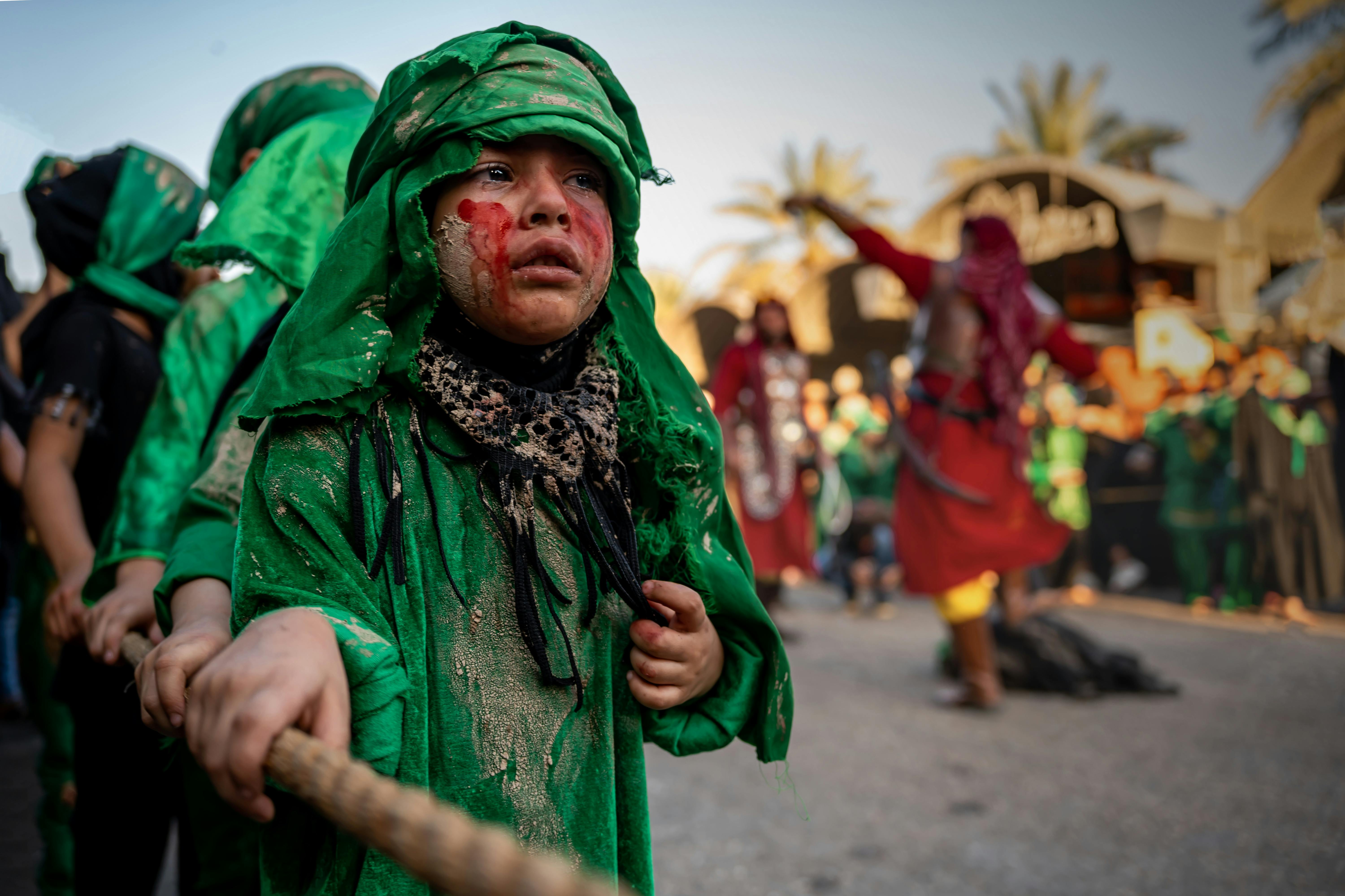Children in Traditional Green Robes at City Festival · Free Stock Photo