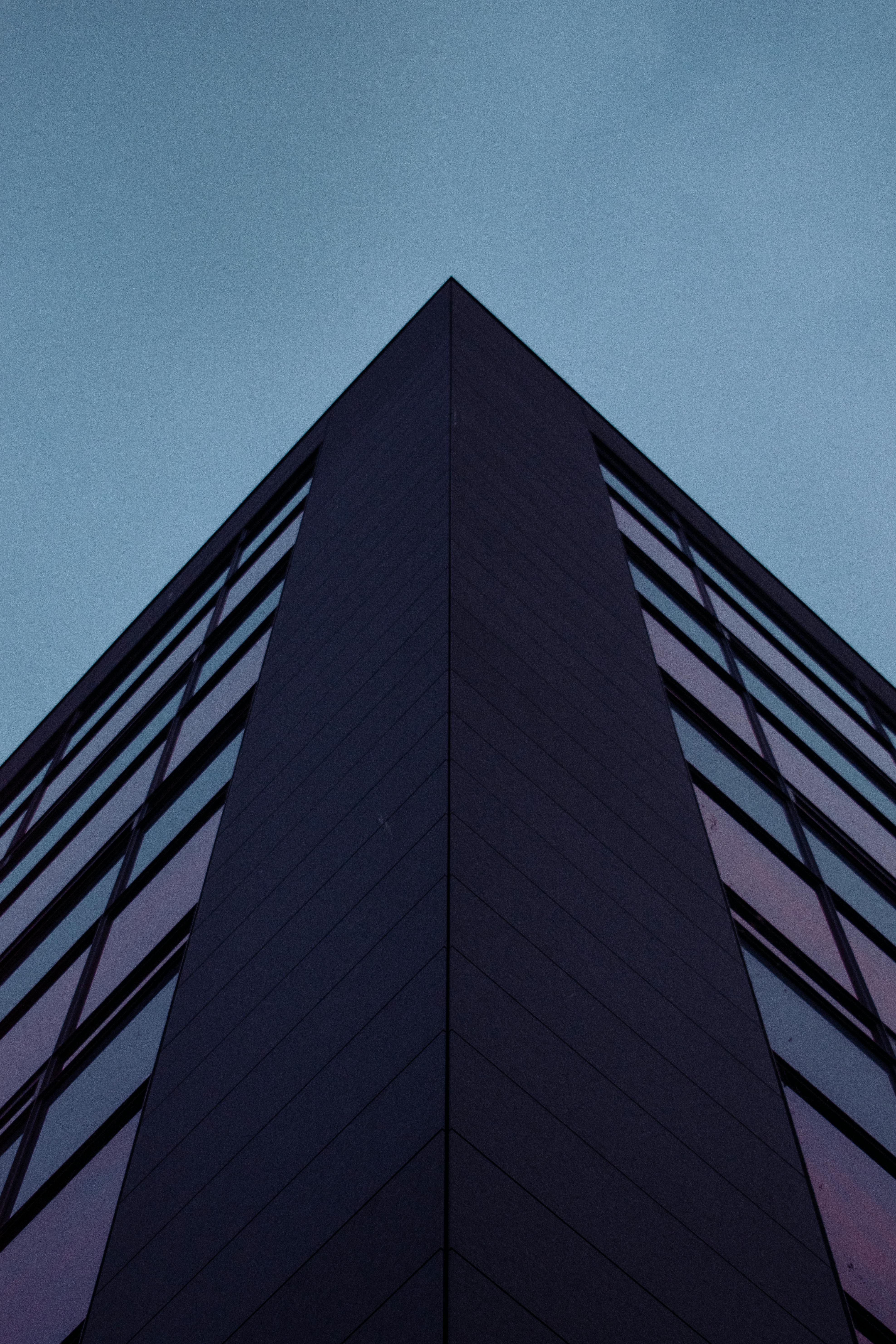 Corner of Dark Office Building · Free Stock Photo