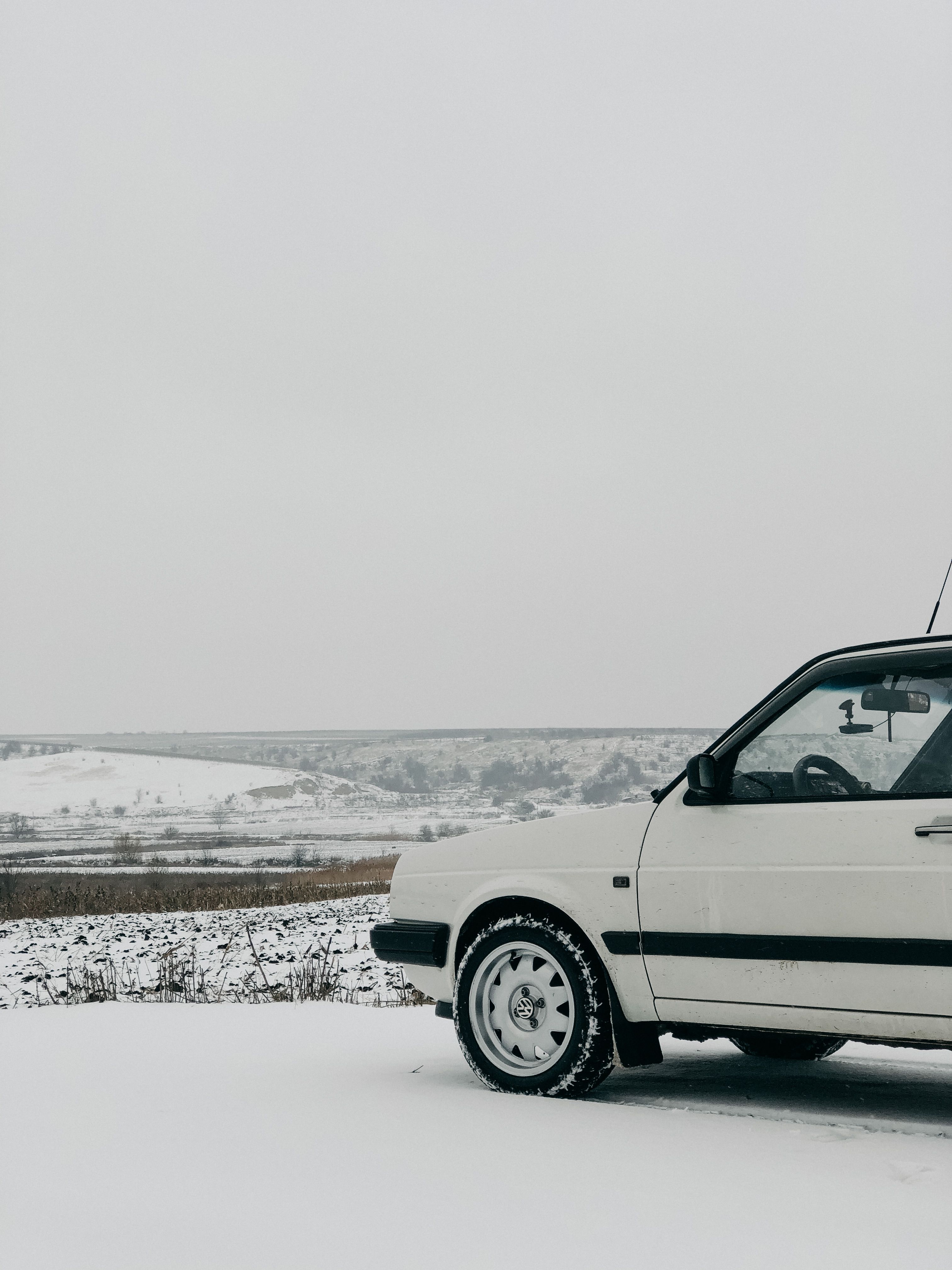 Old Car in Rural Terrain in Winter · Free Stock Photo