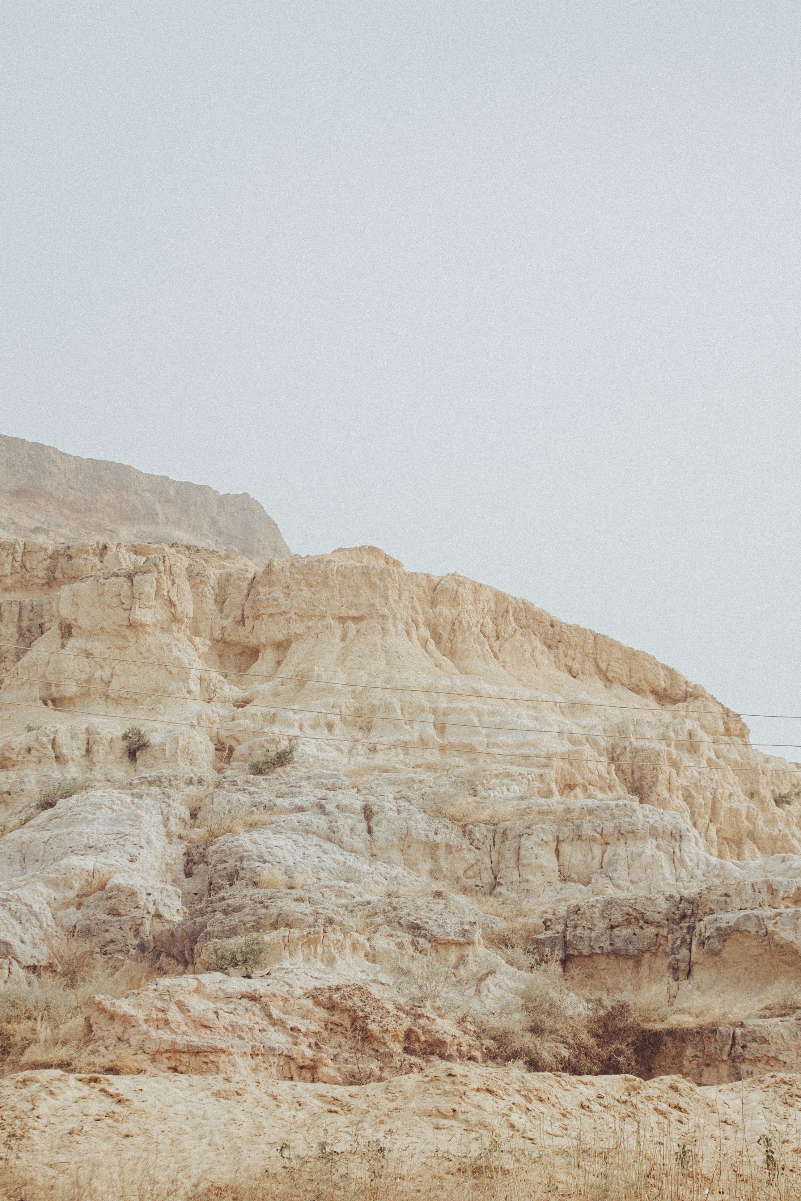 Low Angle Shot of a Mountain Cliffside · Free Stock Photo