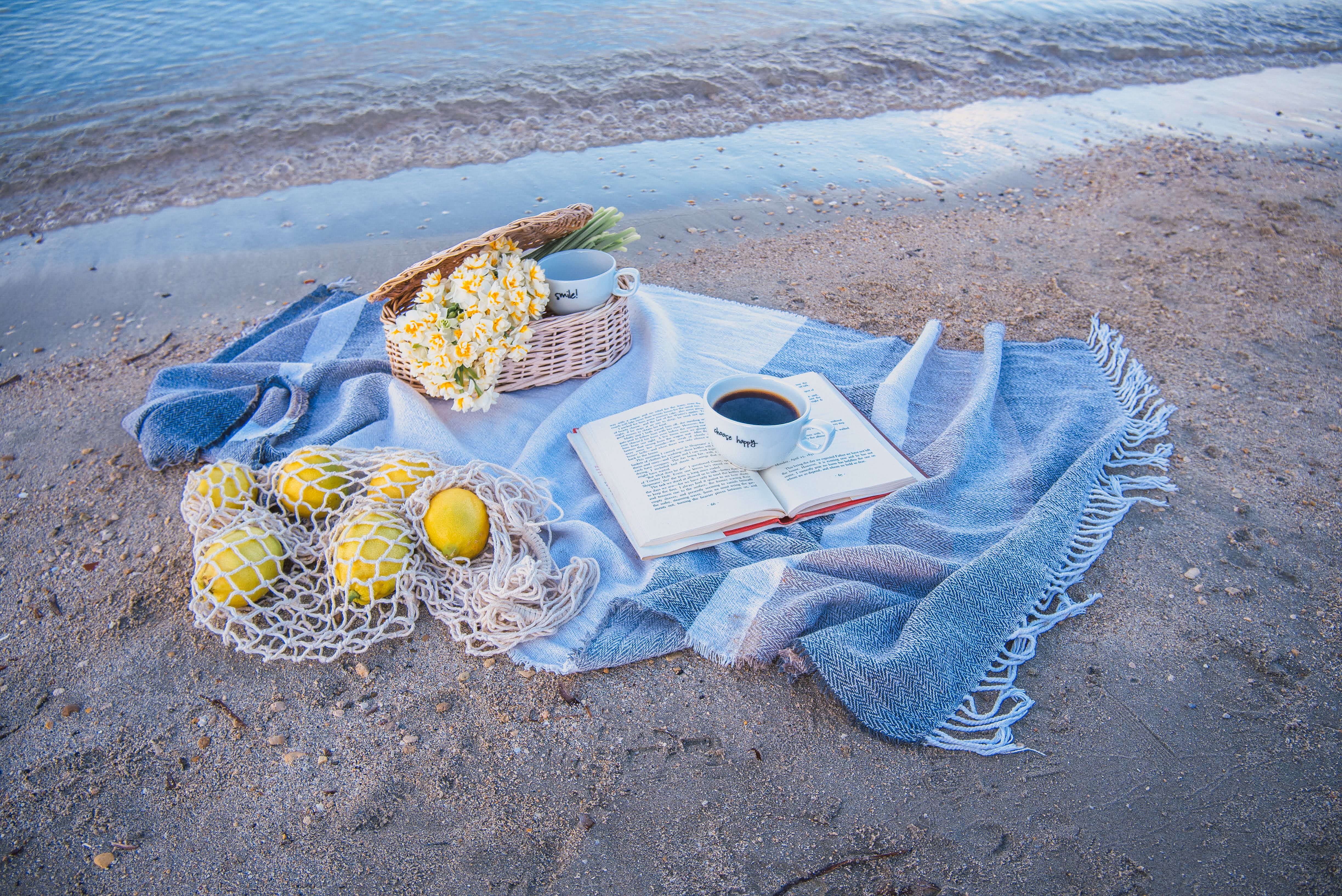 Book and Coffee on the Beach · Free Stock Photo